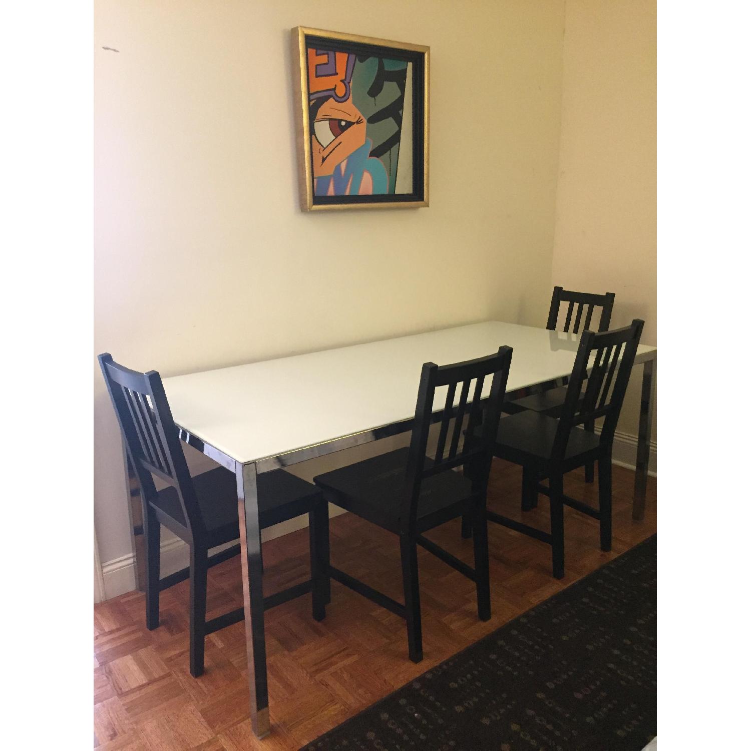 Ikea Glass Top/Steel Frame Dining Table w/ 4 Wood Chairs - AptDeco