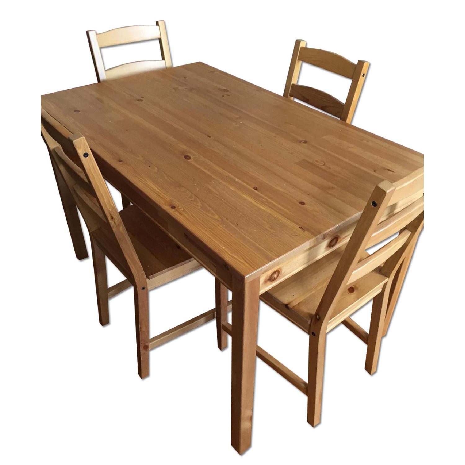 Ikea Wooden Dining Table w/ 4 Chairs - AptDeco
