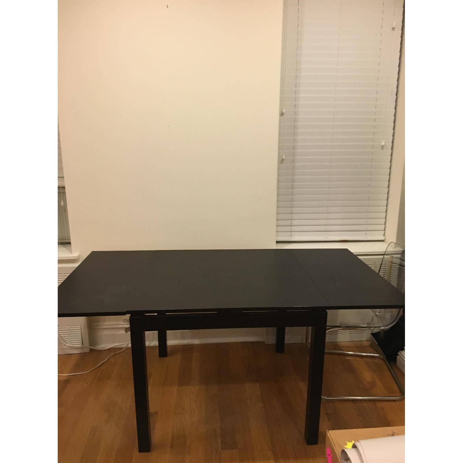 Ikea Bjursta Expandable Dining Table - AptDeco
