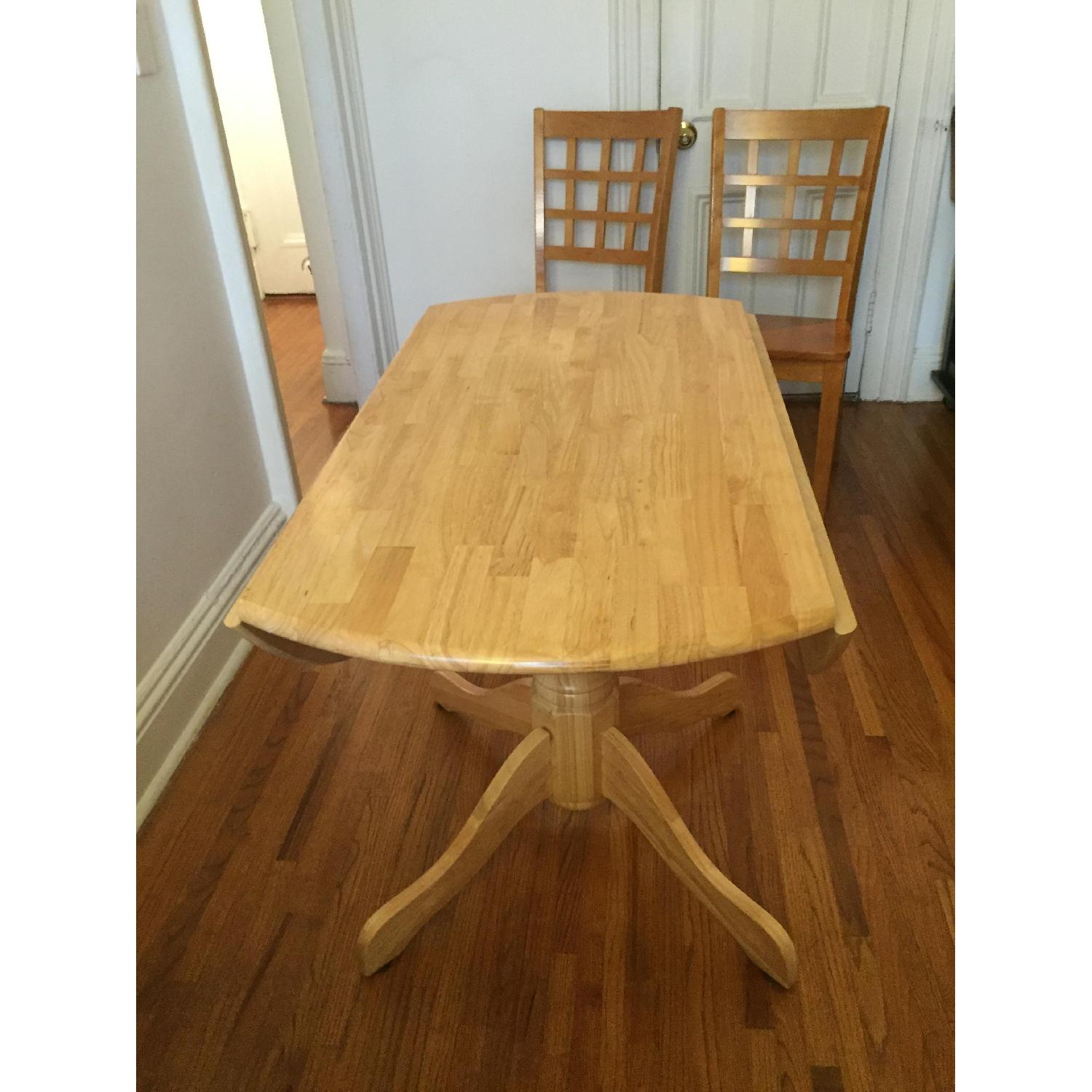 Solid Wood Drop-Leaf Round Table - AptDeco