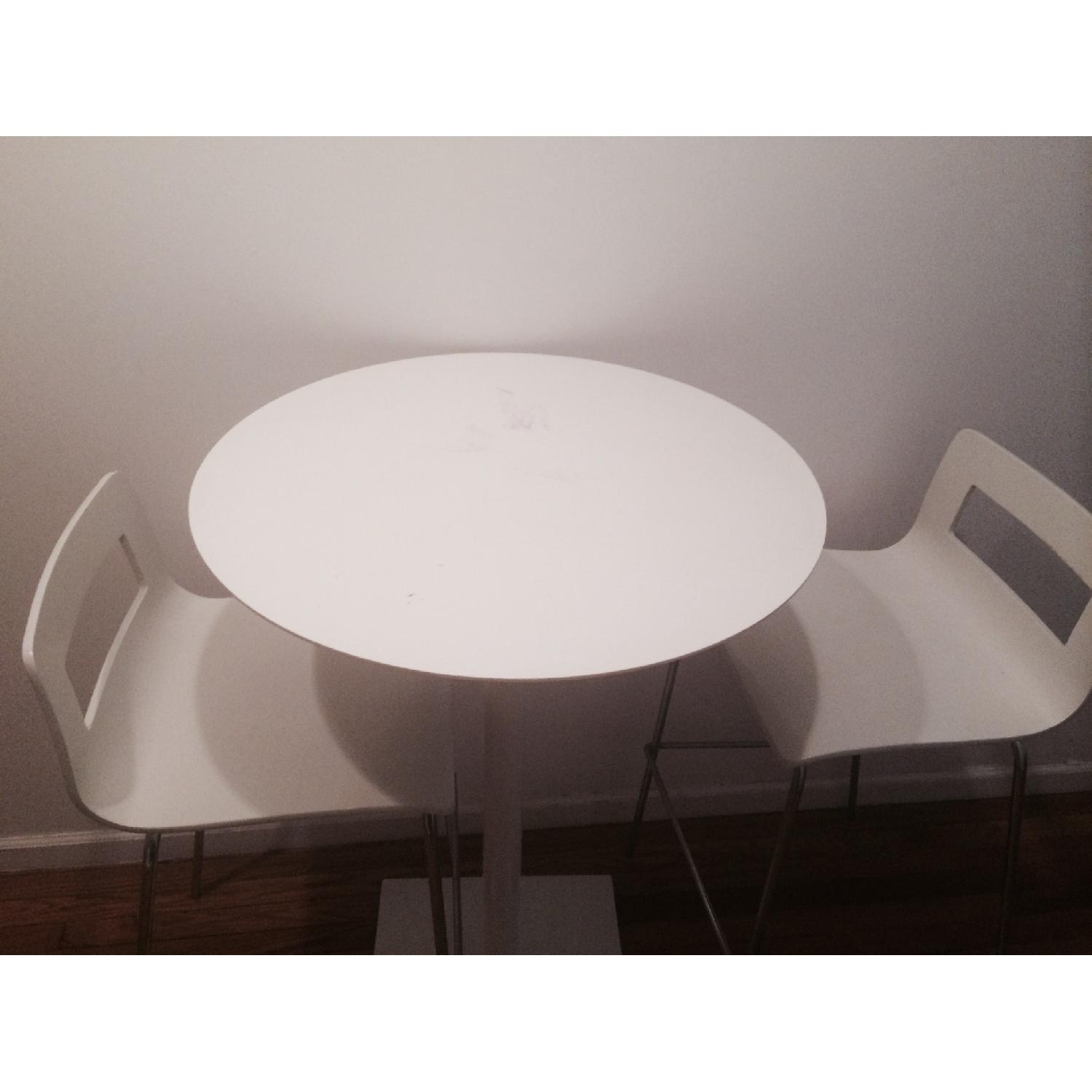 CB2 Dining Table w/ 2 Bar Stools - AptDeco