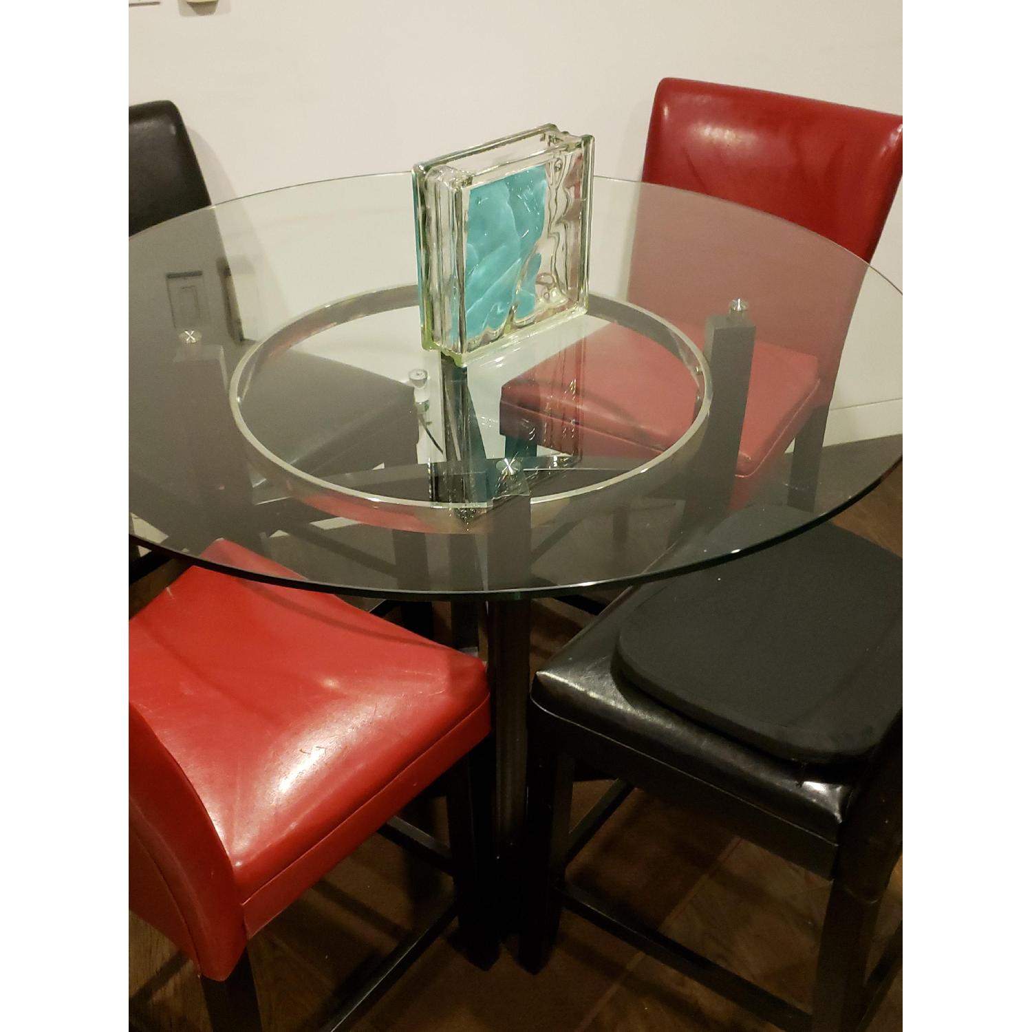 Glass Dining Table w/ 4 Leather Chairs - AptDeco