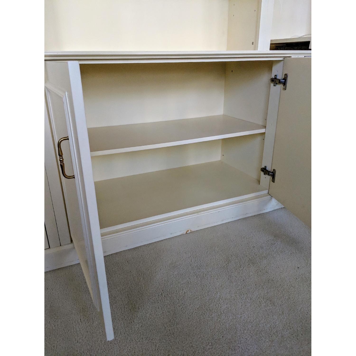 Custom Millwork Shelving Wall Unit in White - AptDeco