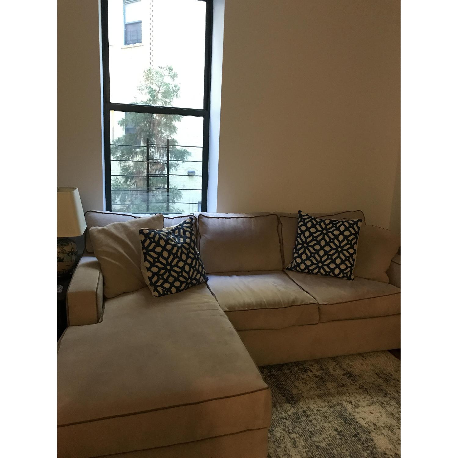 Jennifer Convertibles Sleeper Sectional w/ Reversible Chaise - AptDeco