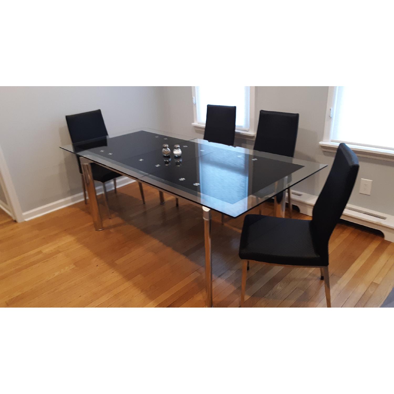 Sliding Extendable Dining Table - AptDeco