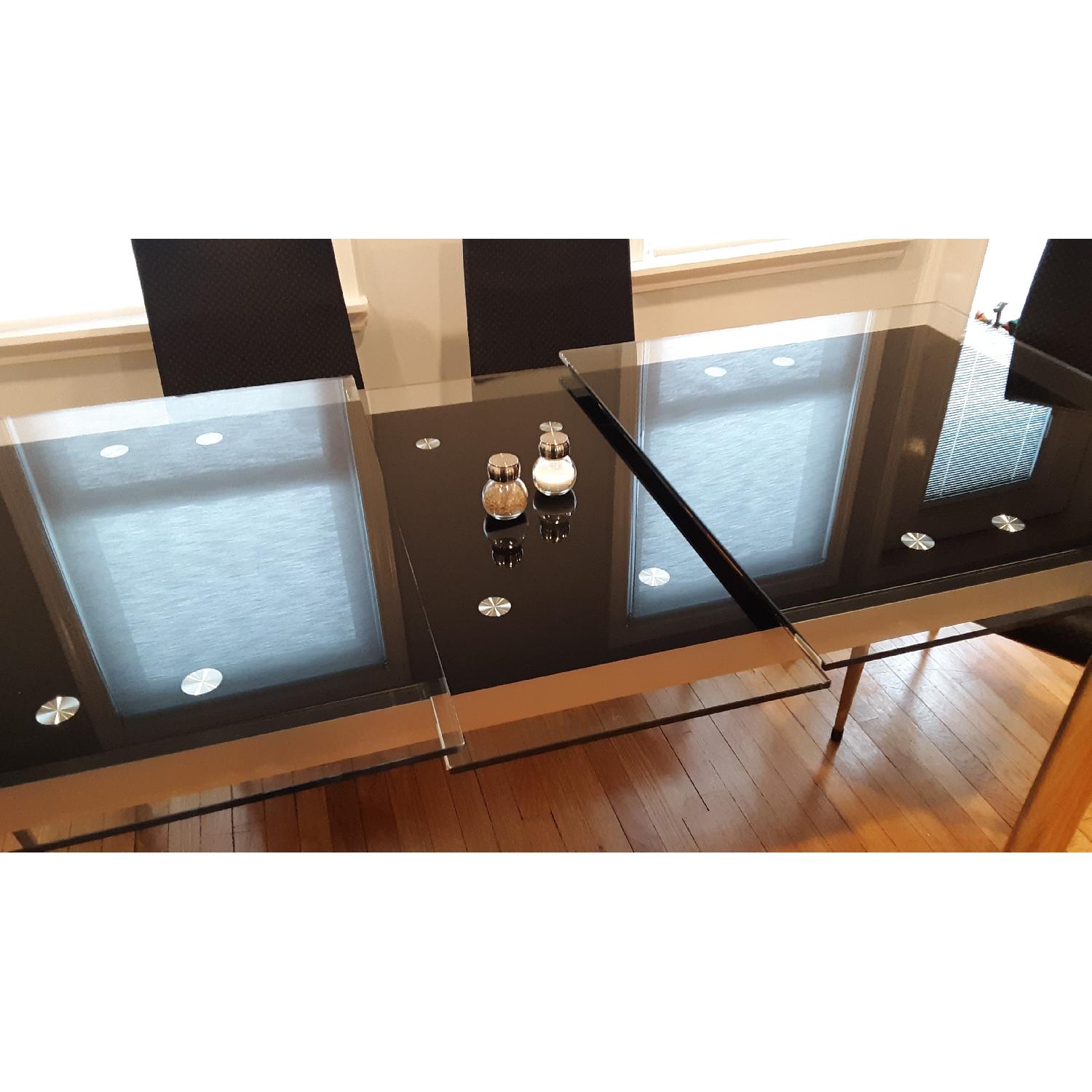 Sliding Extendable Dining Table - AptDeco