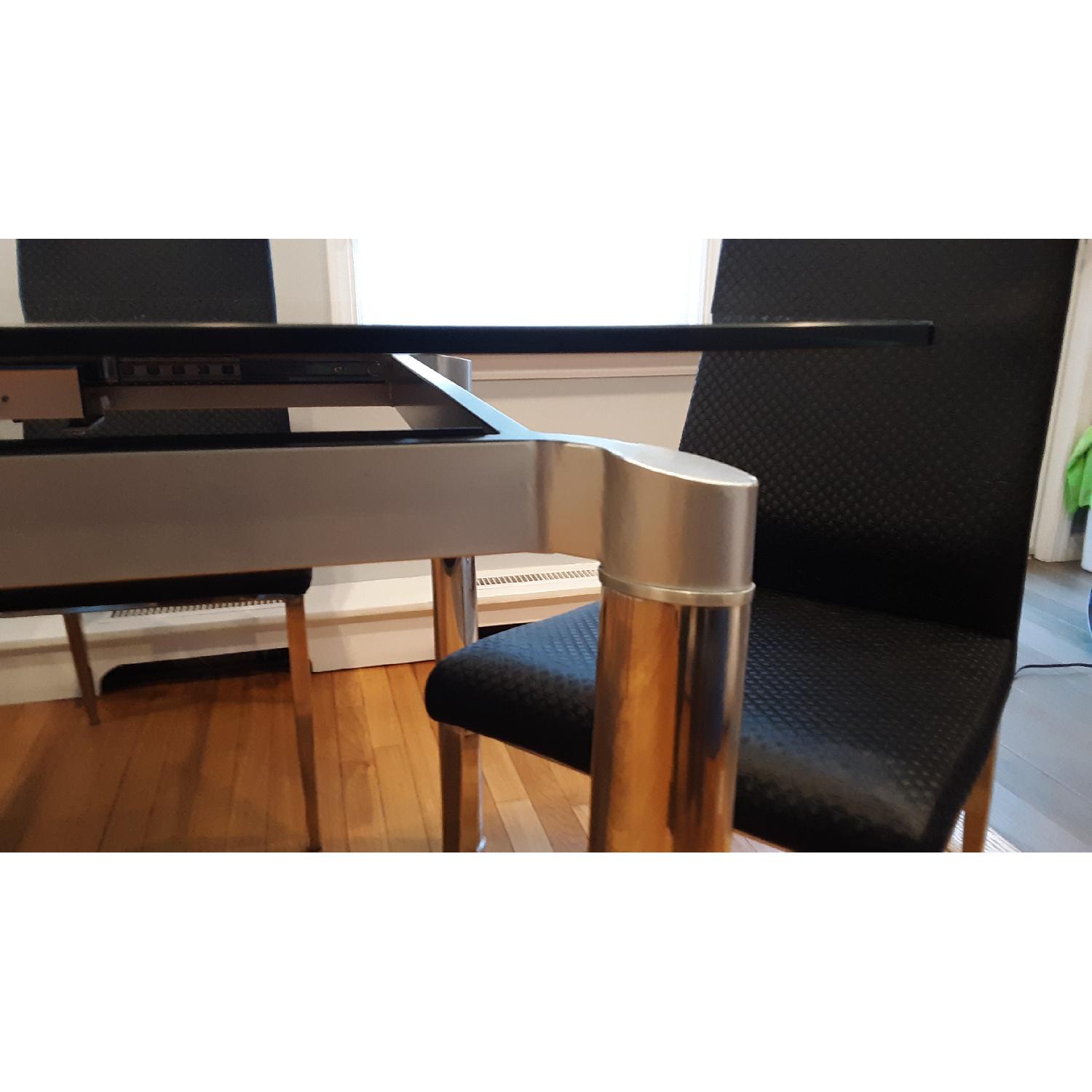 Sliding Extendable Dining Table - AptDeco