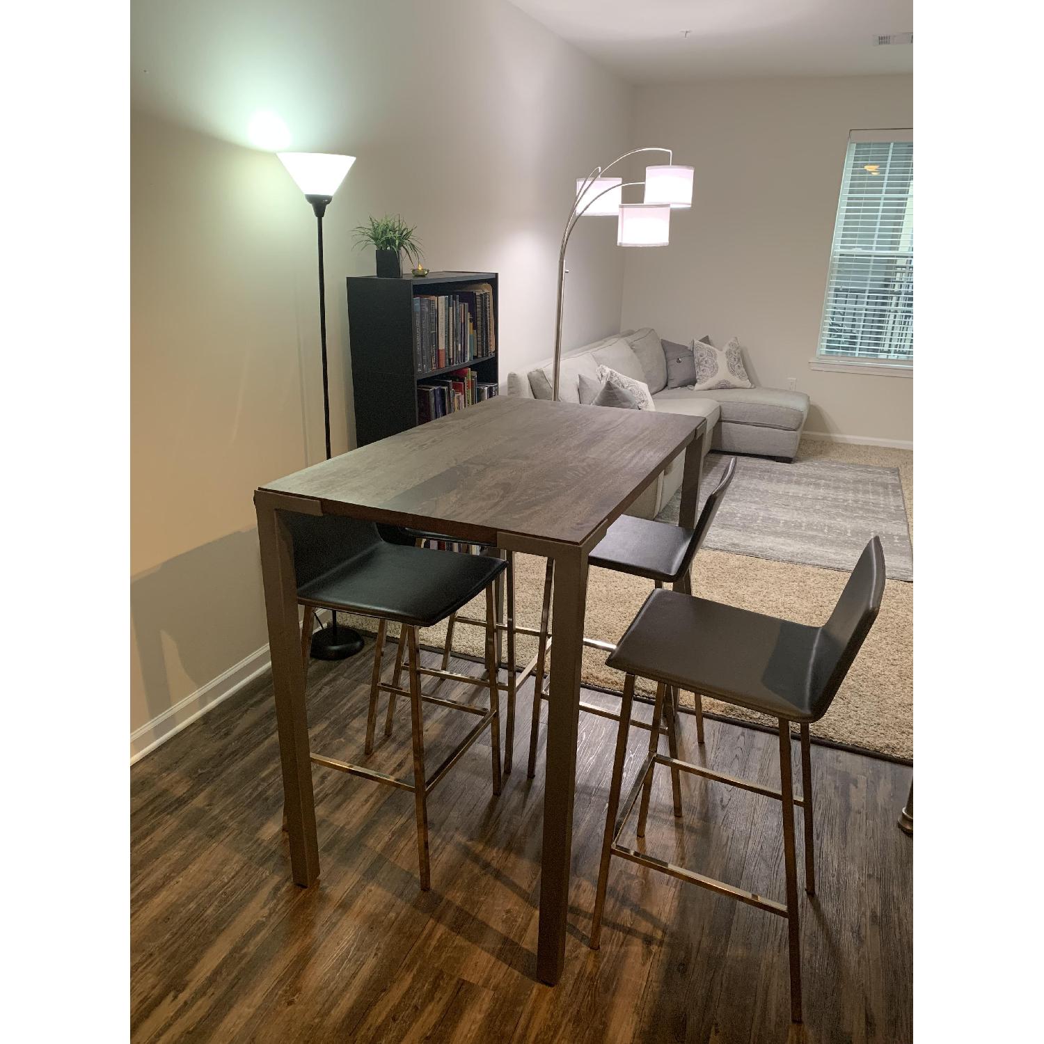 CB2 Stilt Dining Table w/ 4 Carbon Grey Bar Stools - AptDeco