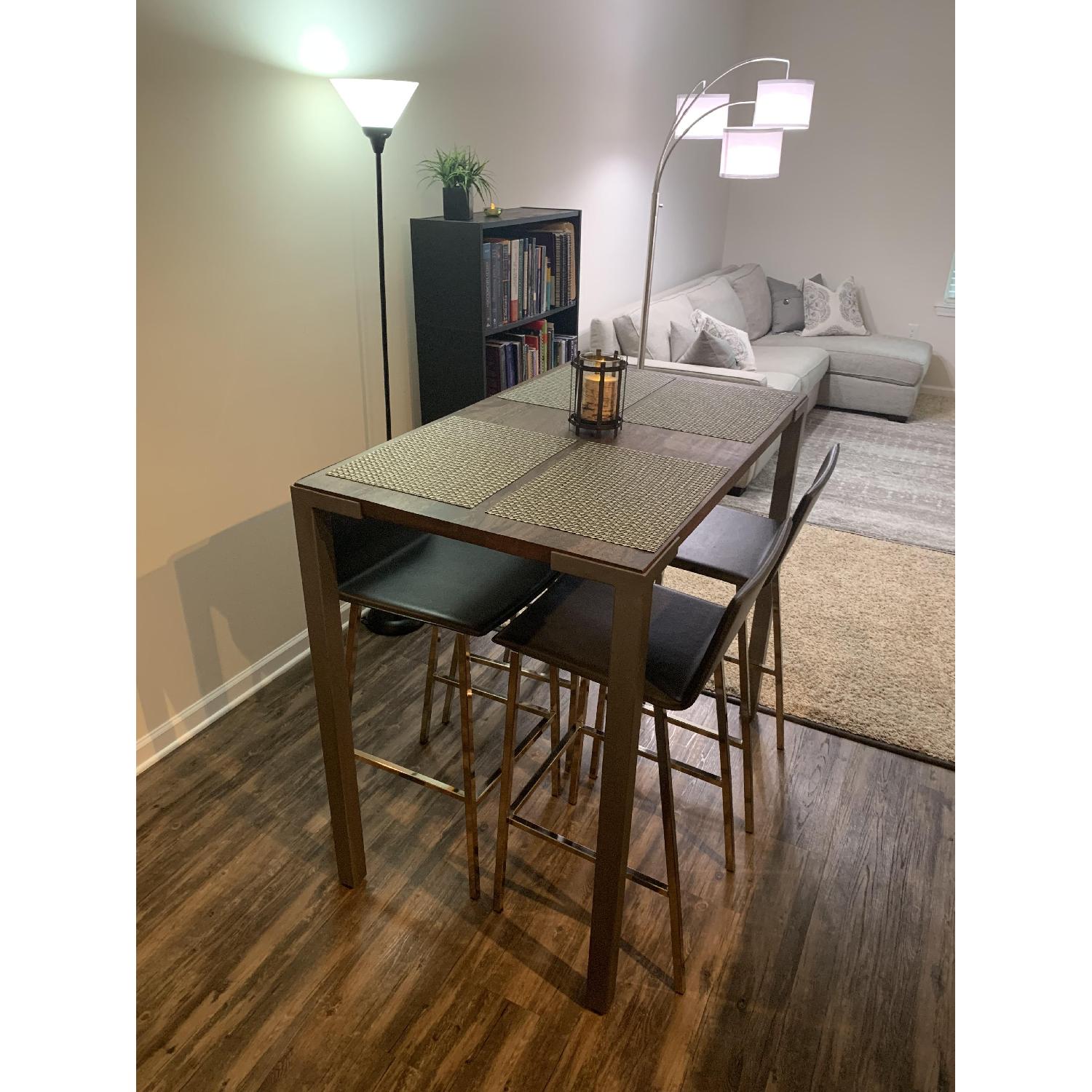 CB2 Stilt Dining Table w/ 4 Carbon Grey Bar Stools - AptDeco