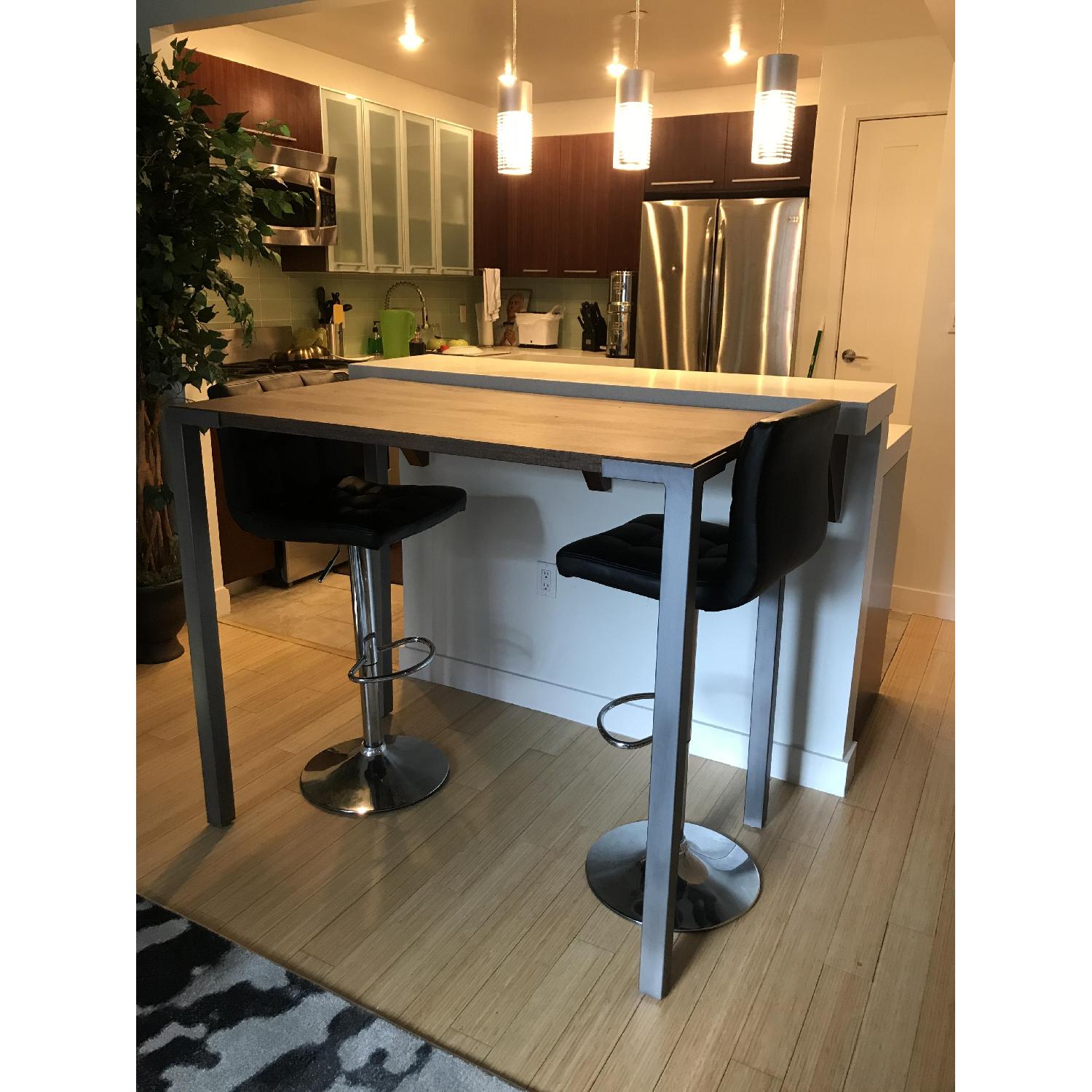 CB2 Modern Industrial Stilt High Dining Table - AptDeco