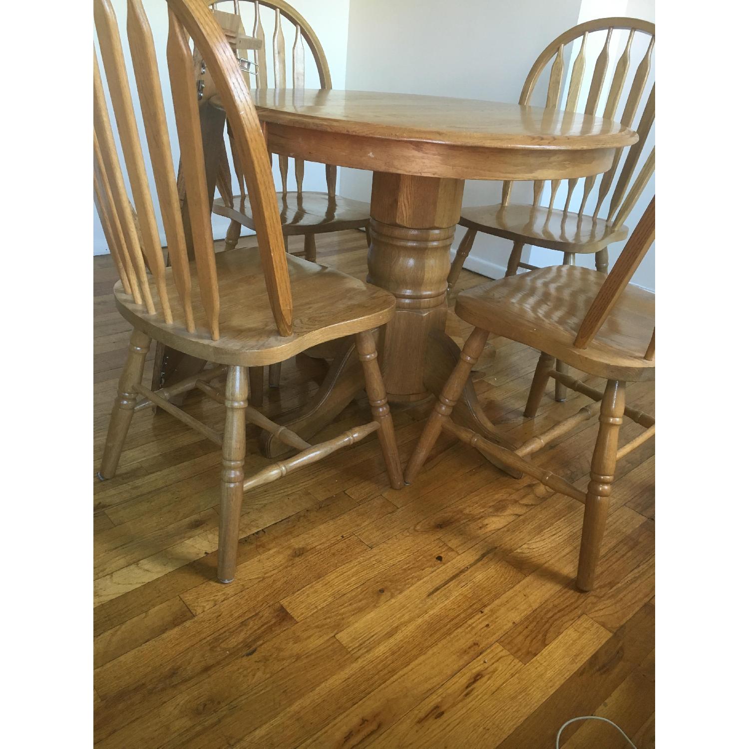 Oak Expandable Dining Table w/ 4 Chairs - AptDeco