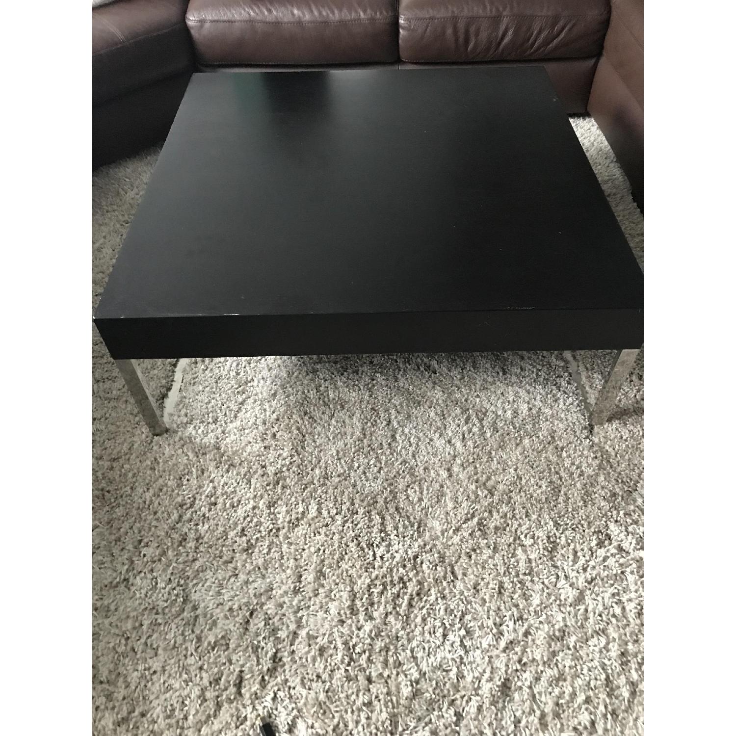 Modani Dark Wood Coffee Table - AptDeco