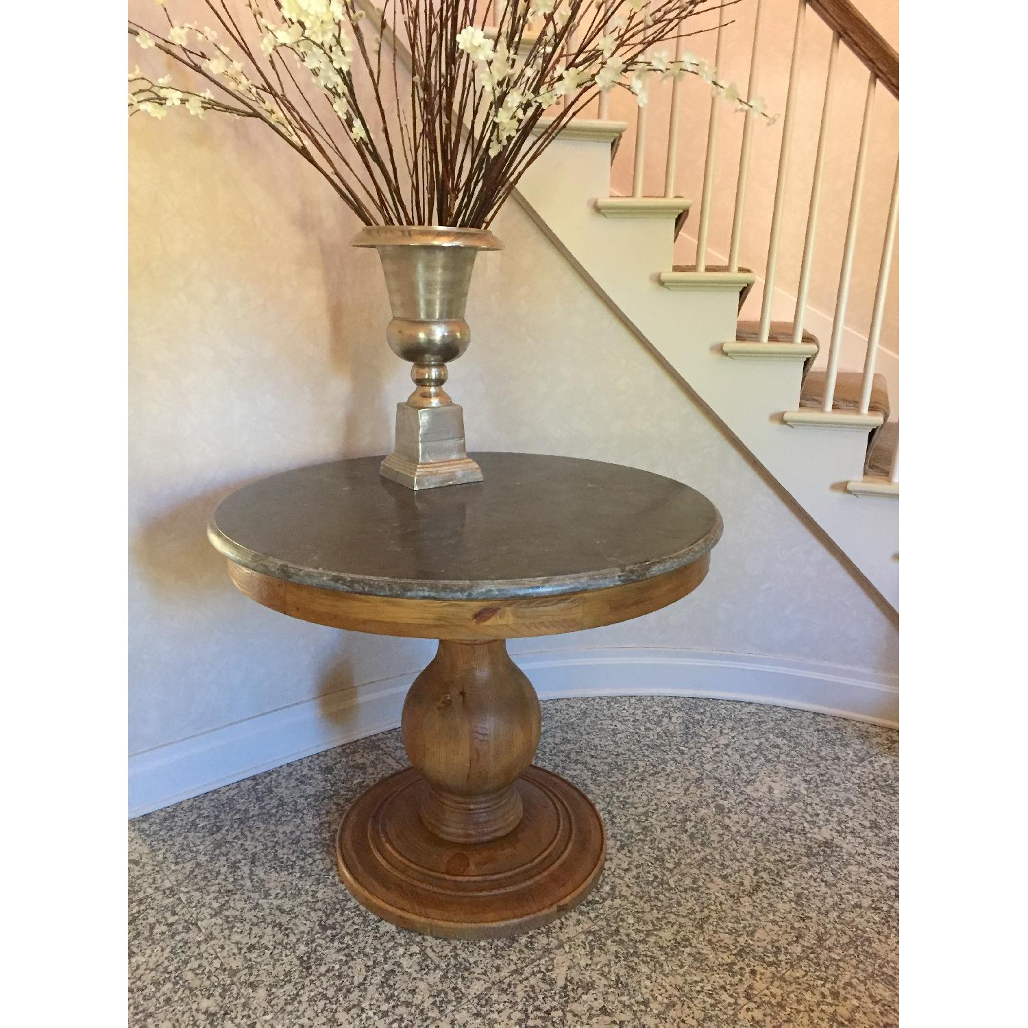 Arhaus Luca Round Dining Table w/ Bluestone Top in Barnwood Brown - AptDeco