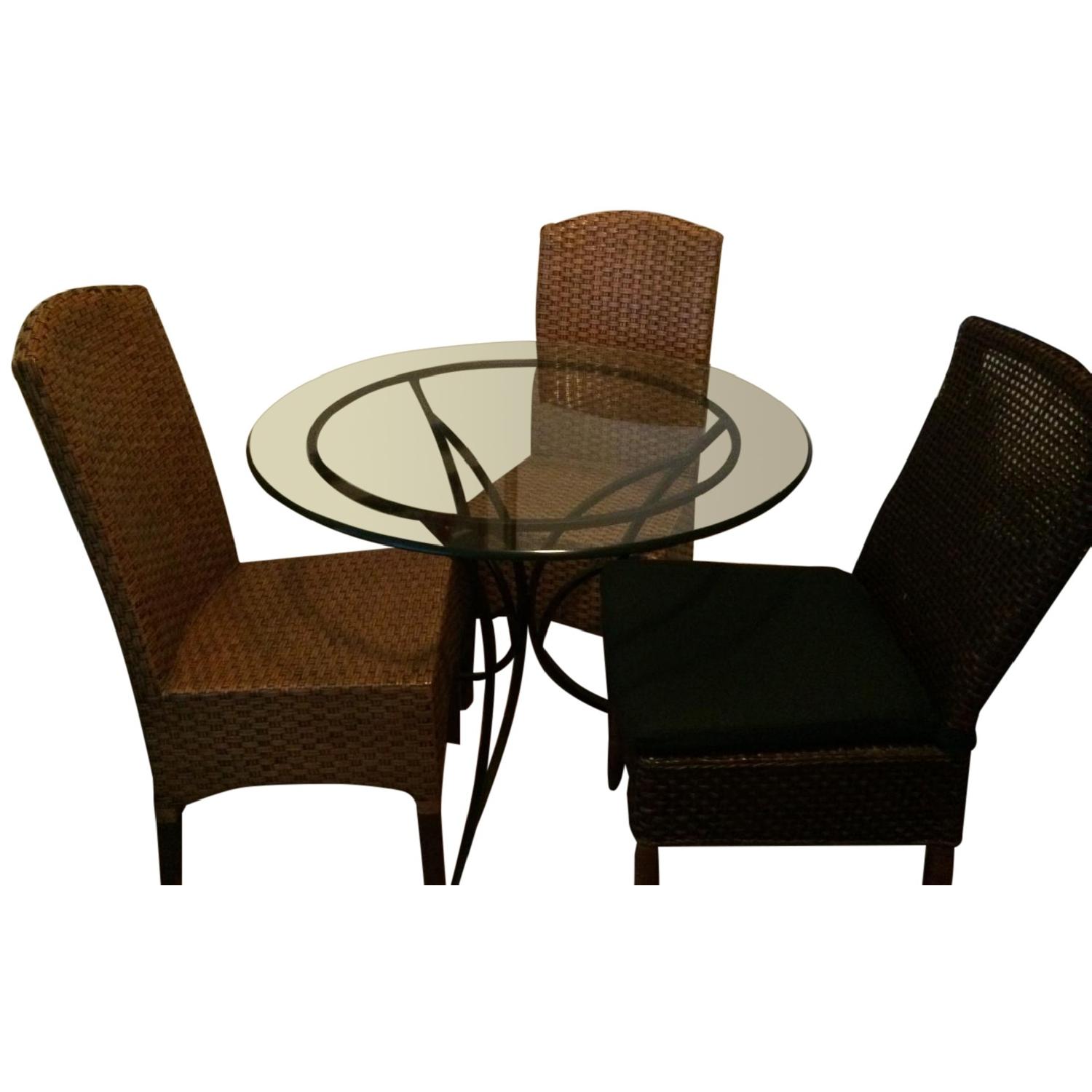 Pier 1 Wrought Iron Table with Circular Glass Top and 3 Wicker Chairs ...