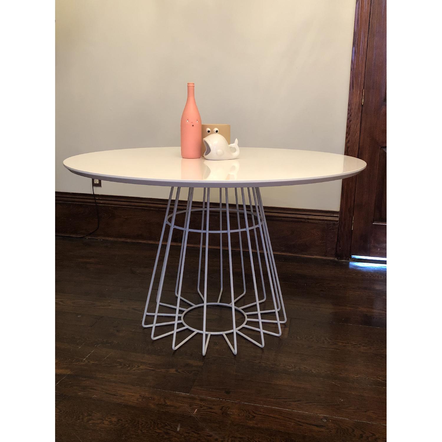 CB2 White Round Dining Table - AptDeco