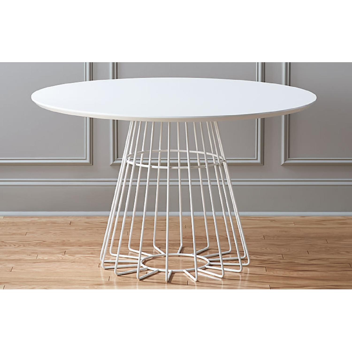 CB2 White Round Dining Table - AptDeco