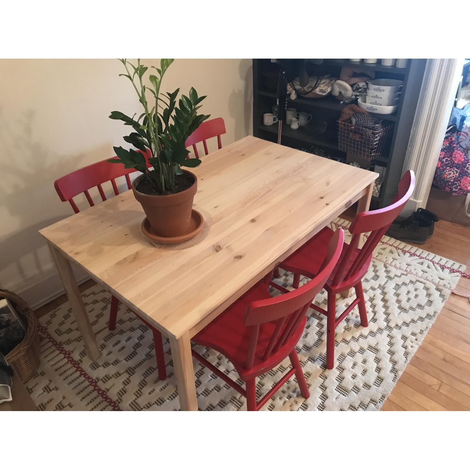Ikea Ingo Natural Pinewood Dining Table w/ 4 Norraryd Chairs - AptDeco