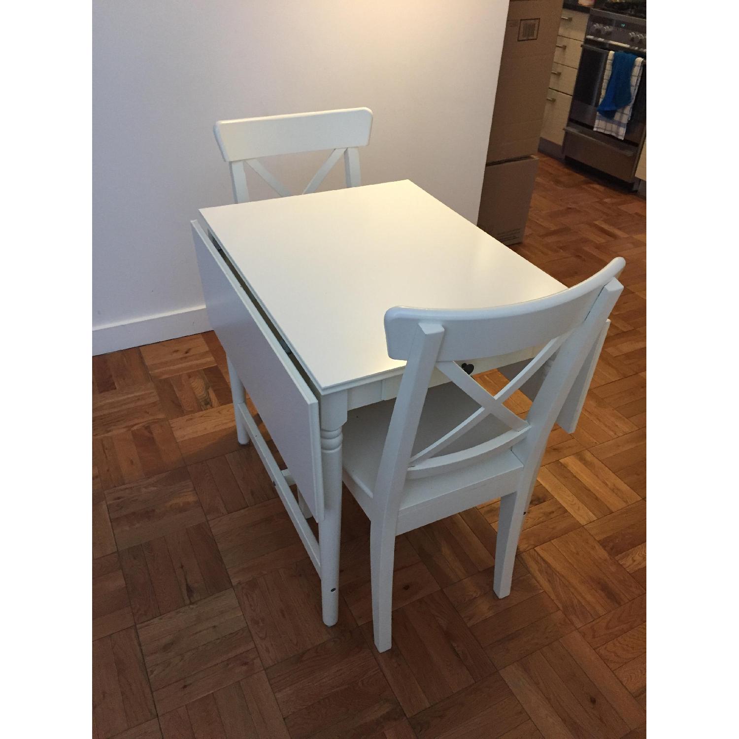 Ikea Ingatorp Dining Table w/ 2 Ingolf Chairs - AptDeco