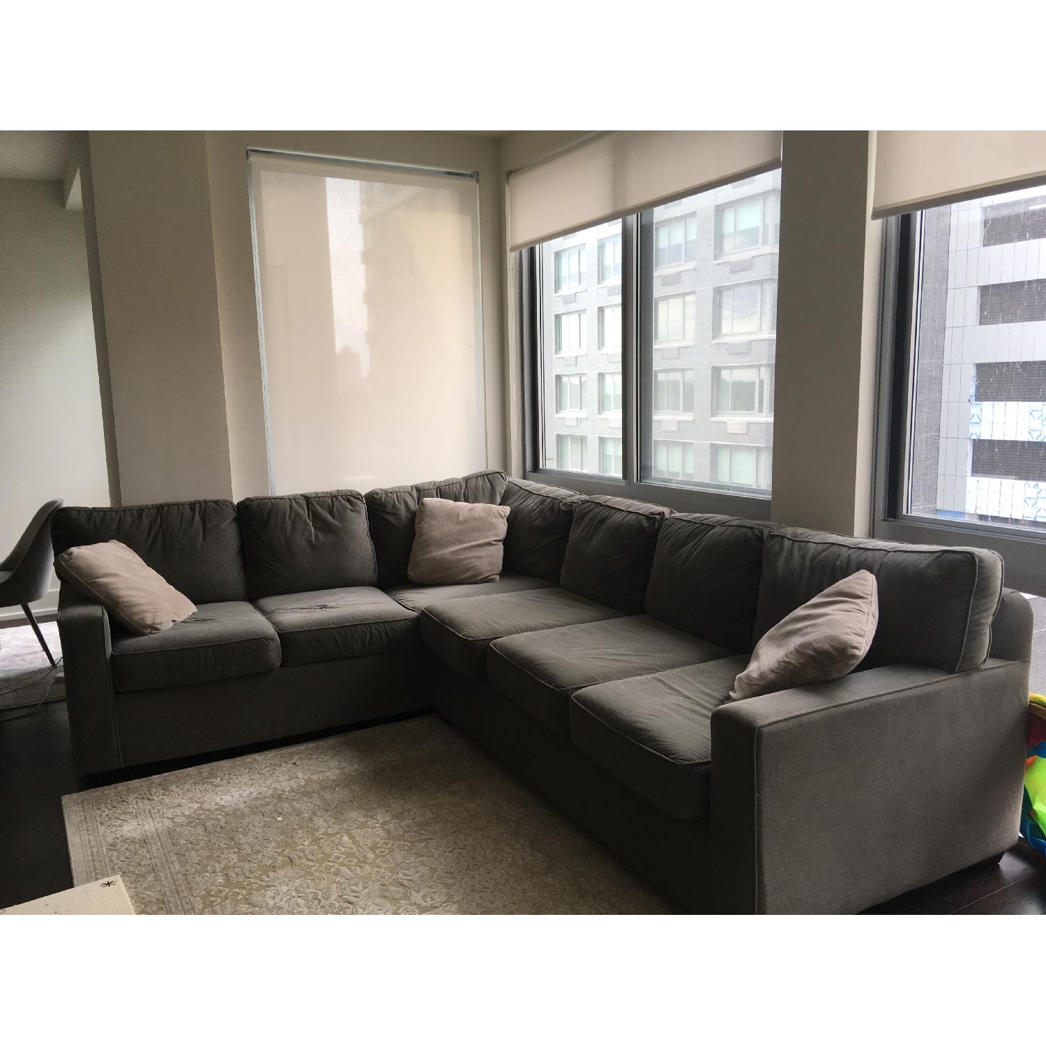 Jennifer Convertibles L-Shaped Sleeper Sectional Sofa - AptDeco