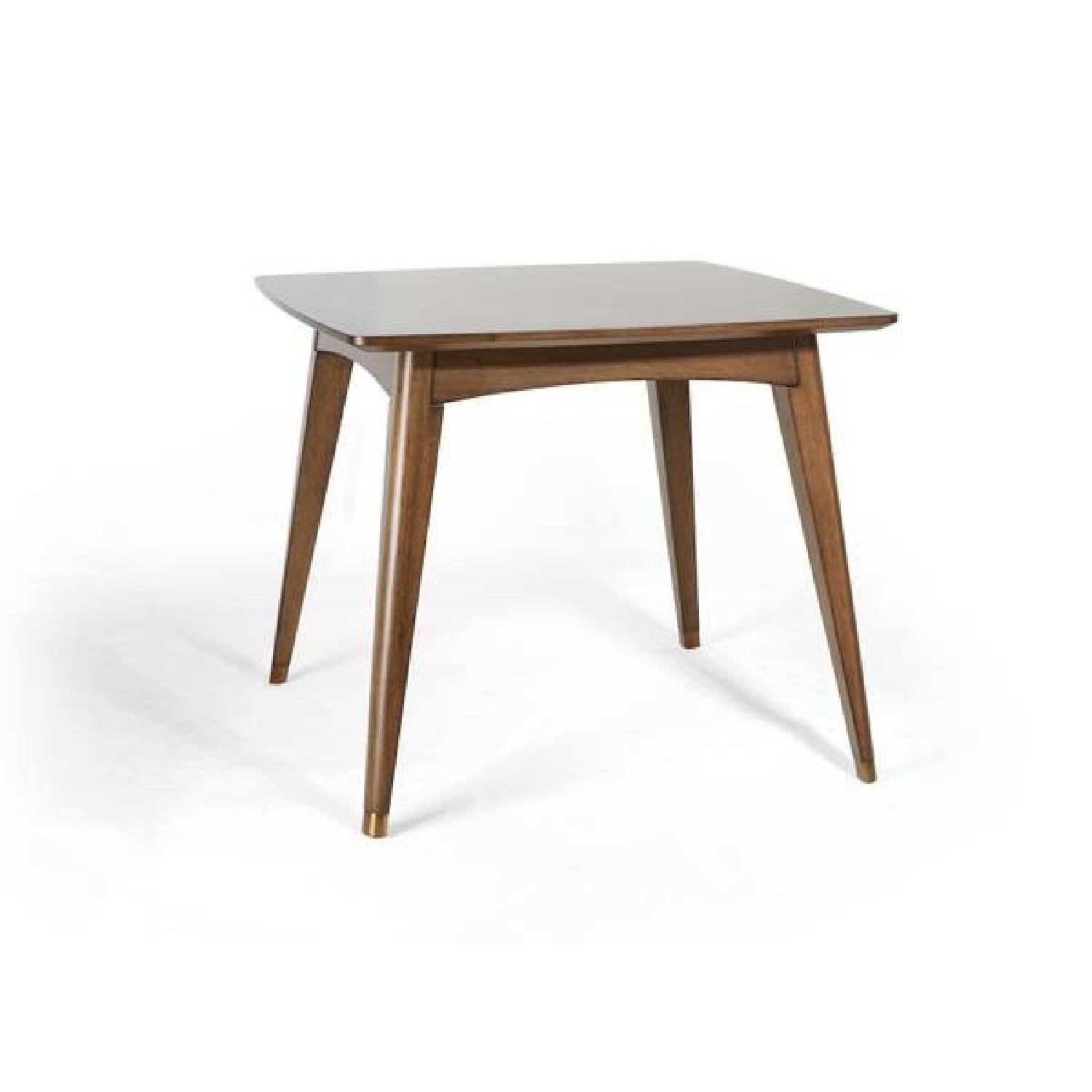 Mid-Century Modern Expandable Solid Wood Dining Table - AptDeco