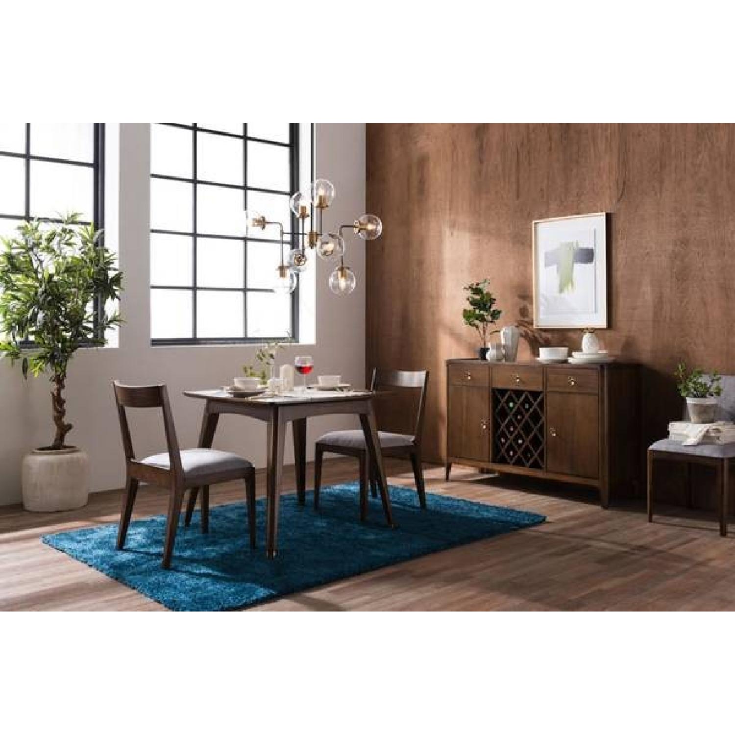 Mid-Century Modern Expandable Solid Wood Dining Table - AptDeco