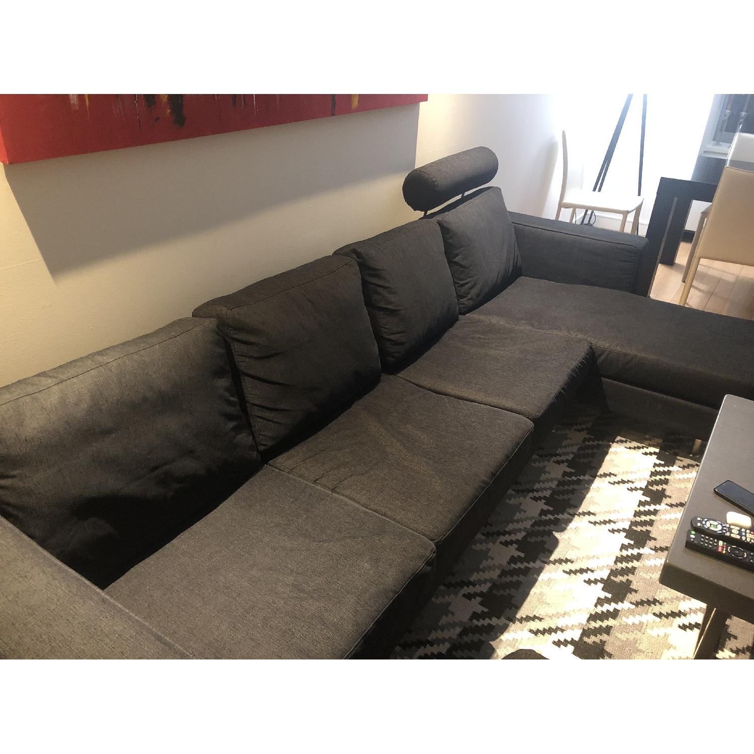 BoConcept Black Sectional Sofa & Convertible Ottoman - AptDeco