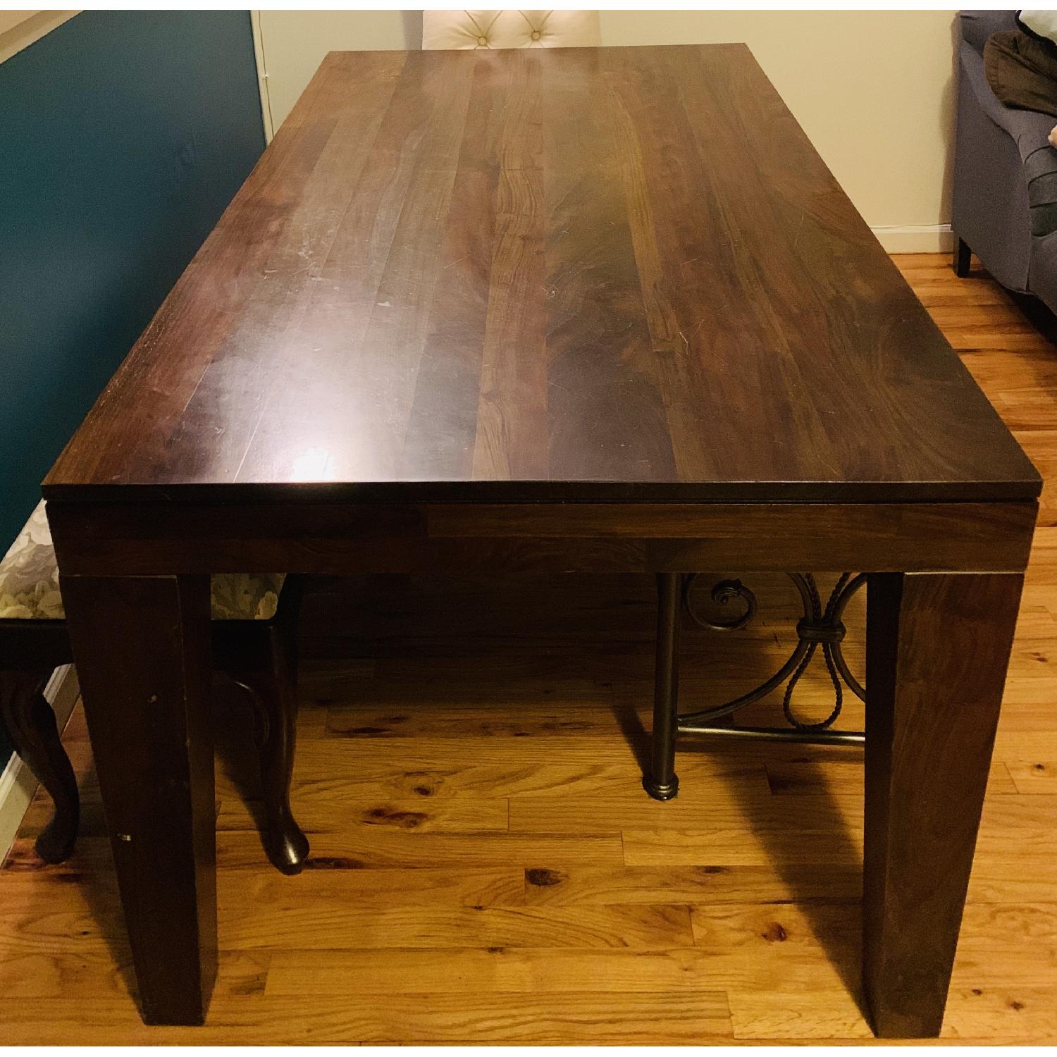 West Elm Farmhouse Style Wooden Dining Table - AptDeco