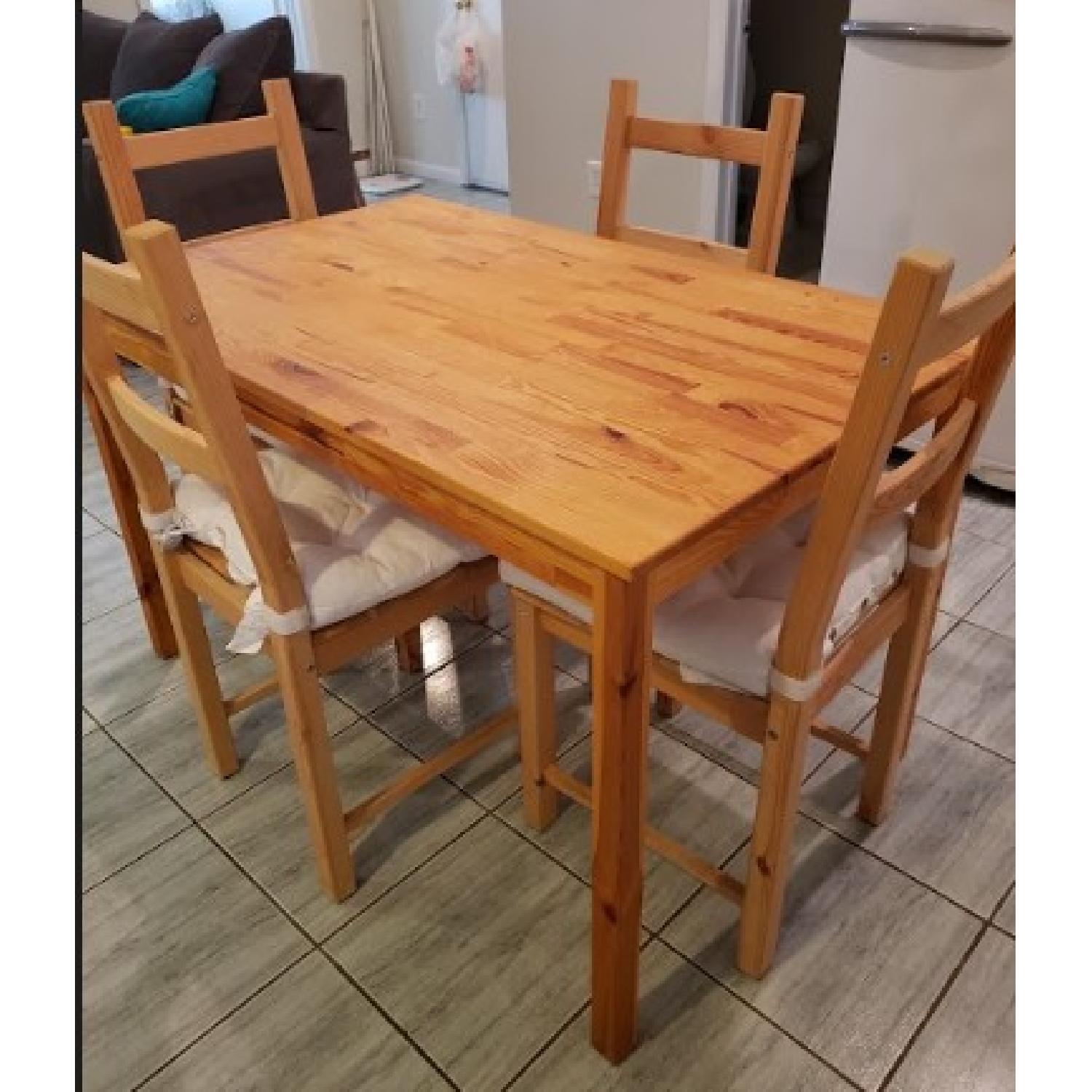 Ikea Ingo Natural Pinewood Dining Table w/ 4 Chairs - AptDeco