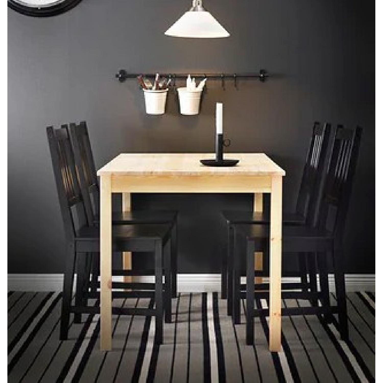 Ikea Ingo Natural Pinewood Dining Table - AptDeco