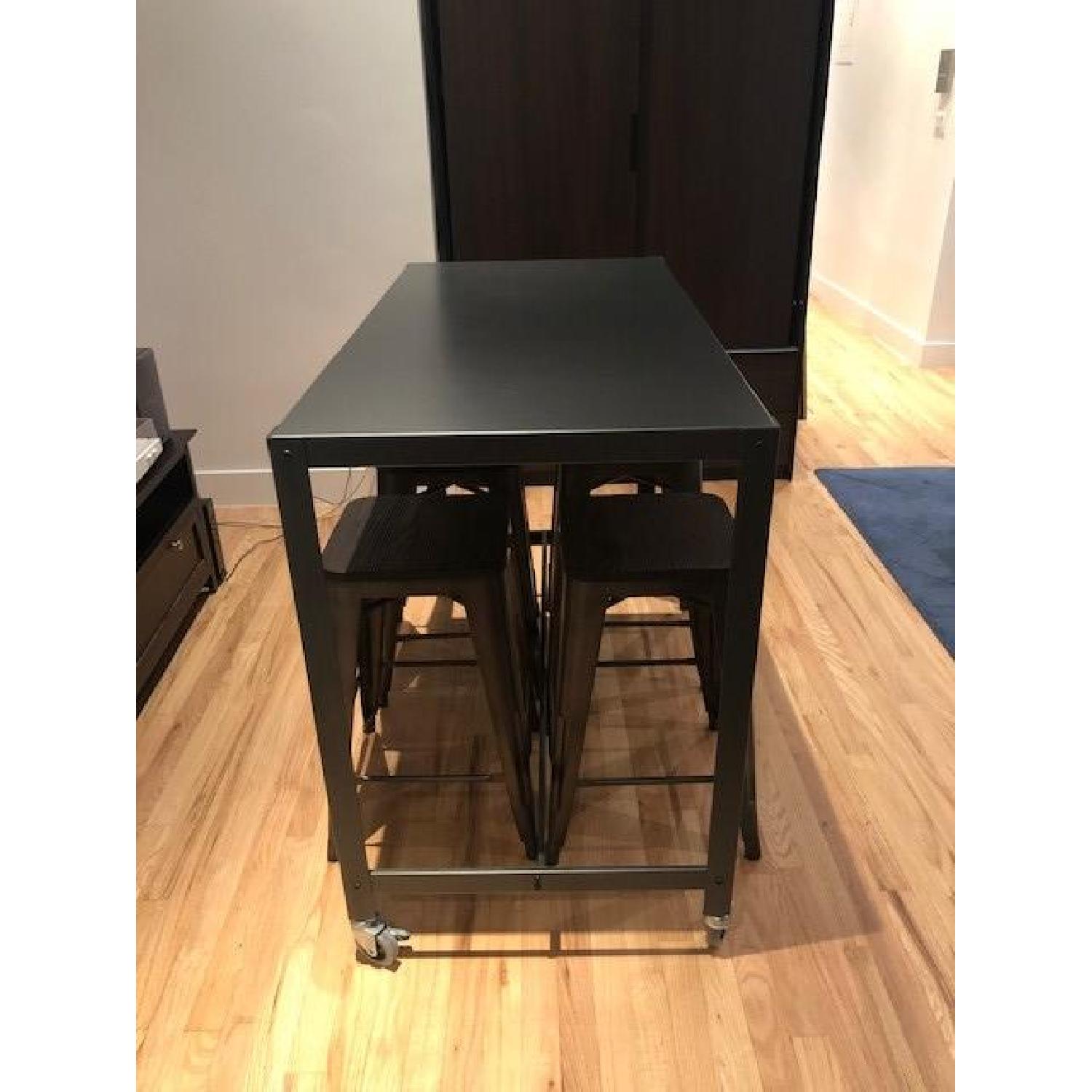 CB2 Go-Cart Rolling Desk in Carbon w/ 4 Stools - AptDeco