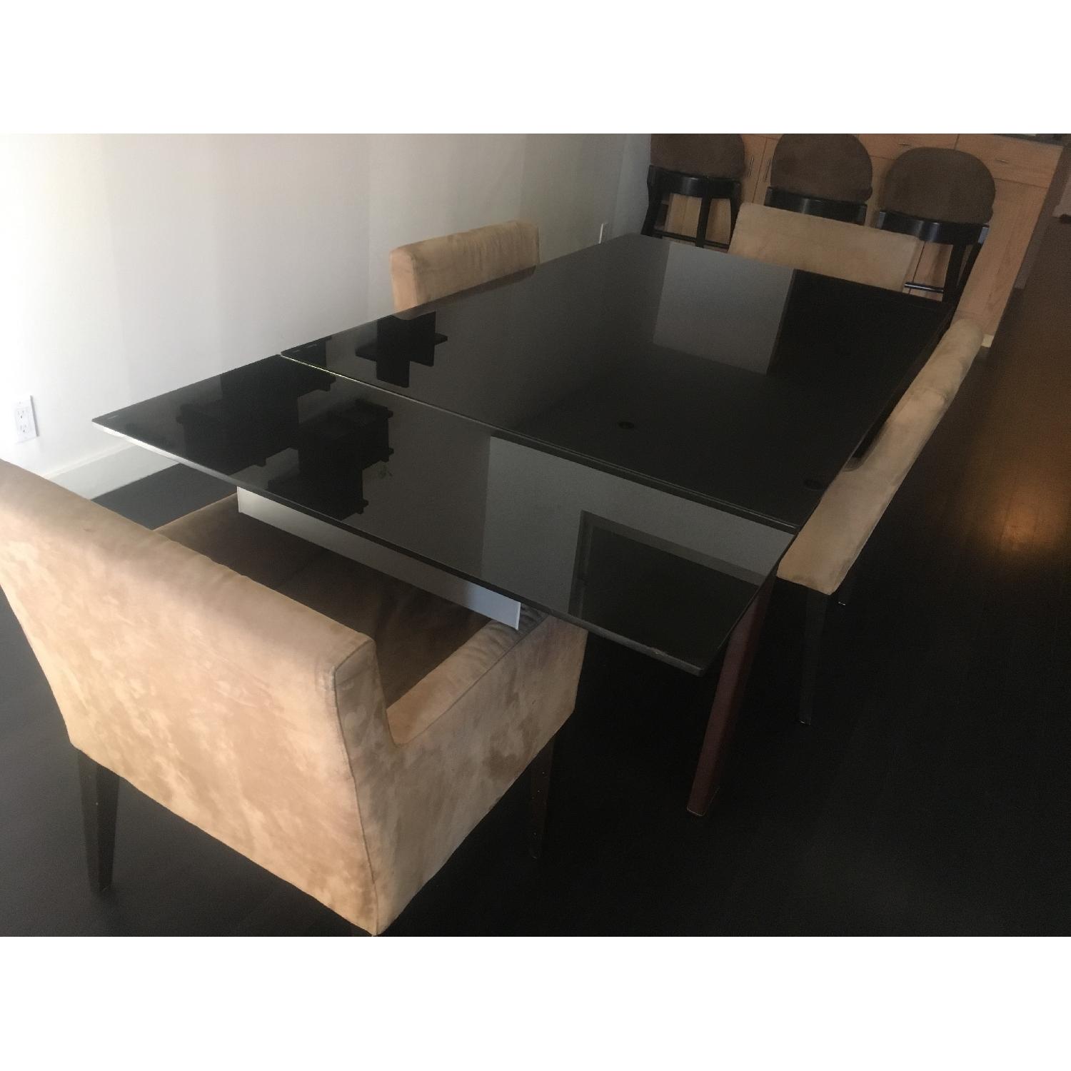 Expandable Black Tempered Glass Dining Table - AptDeco