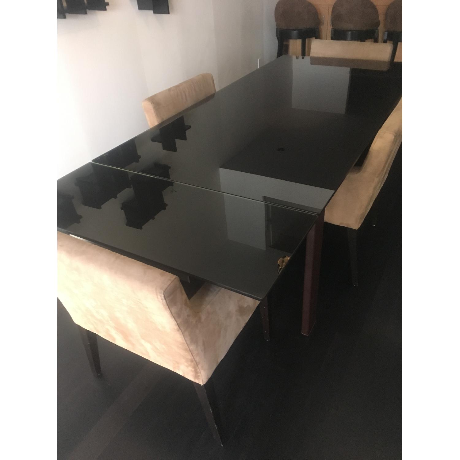 Expandable Black Tempered Glass Dining Table - AptDeco