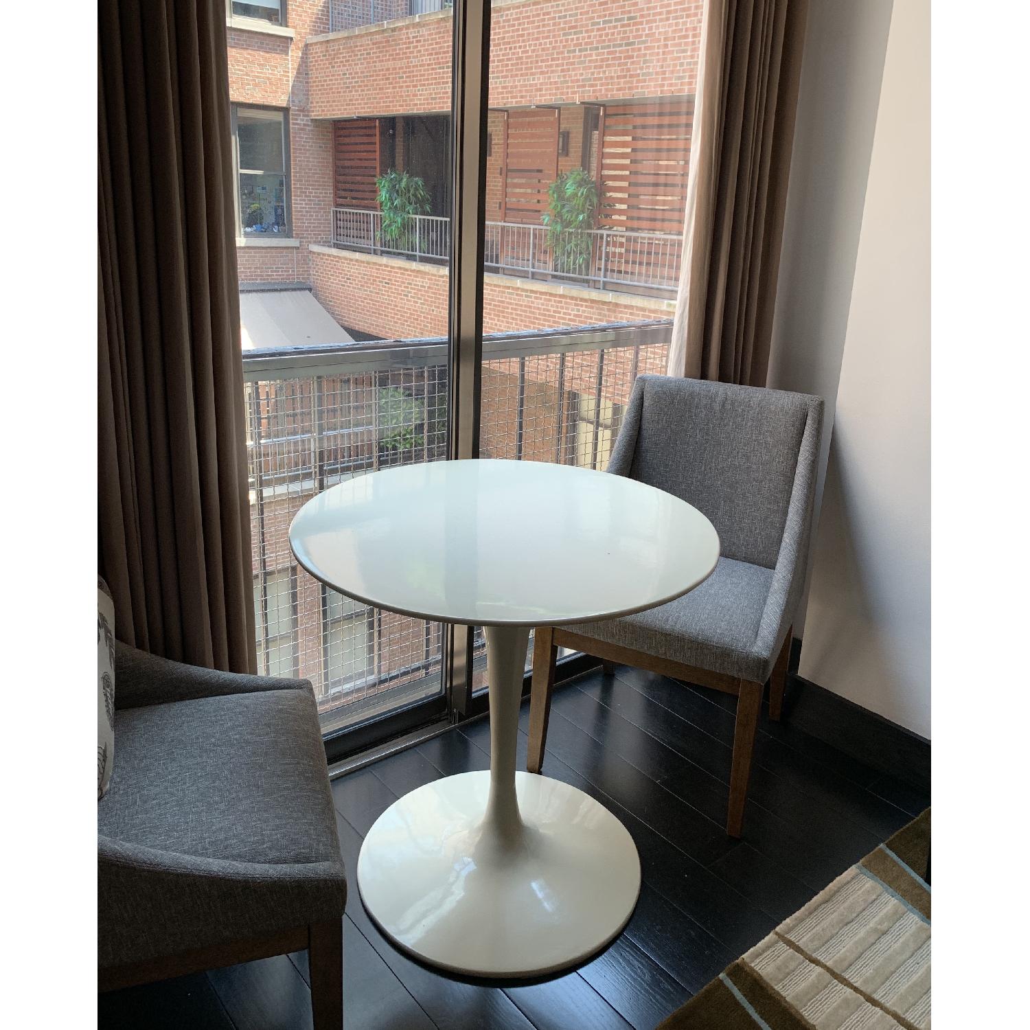 Pottery Barn Round Dining Table - AptDeco