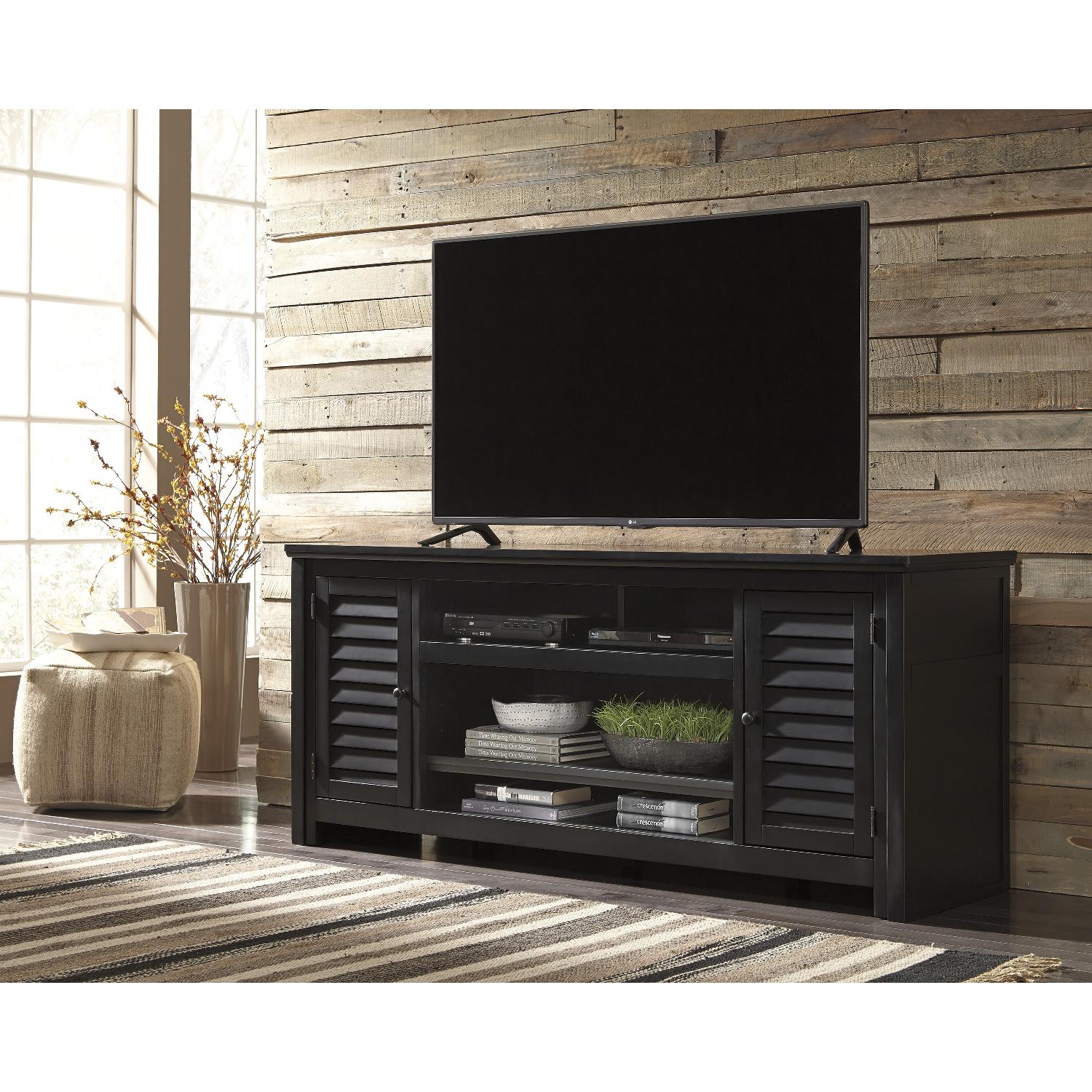 Ashley's Brasenhaus Black Extra Large TV Stand - AptDeco