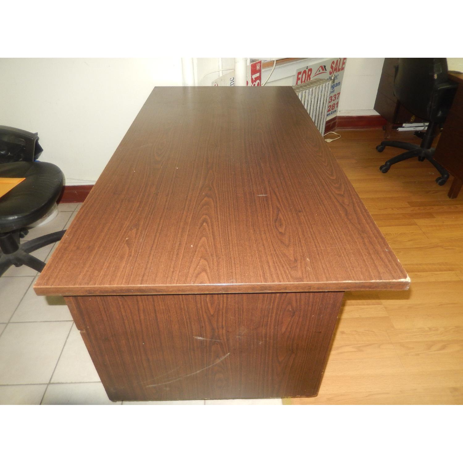 Cort Furniture Solid Wooden Office Desk w/ 5 Drawers - AptDeco