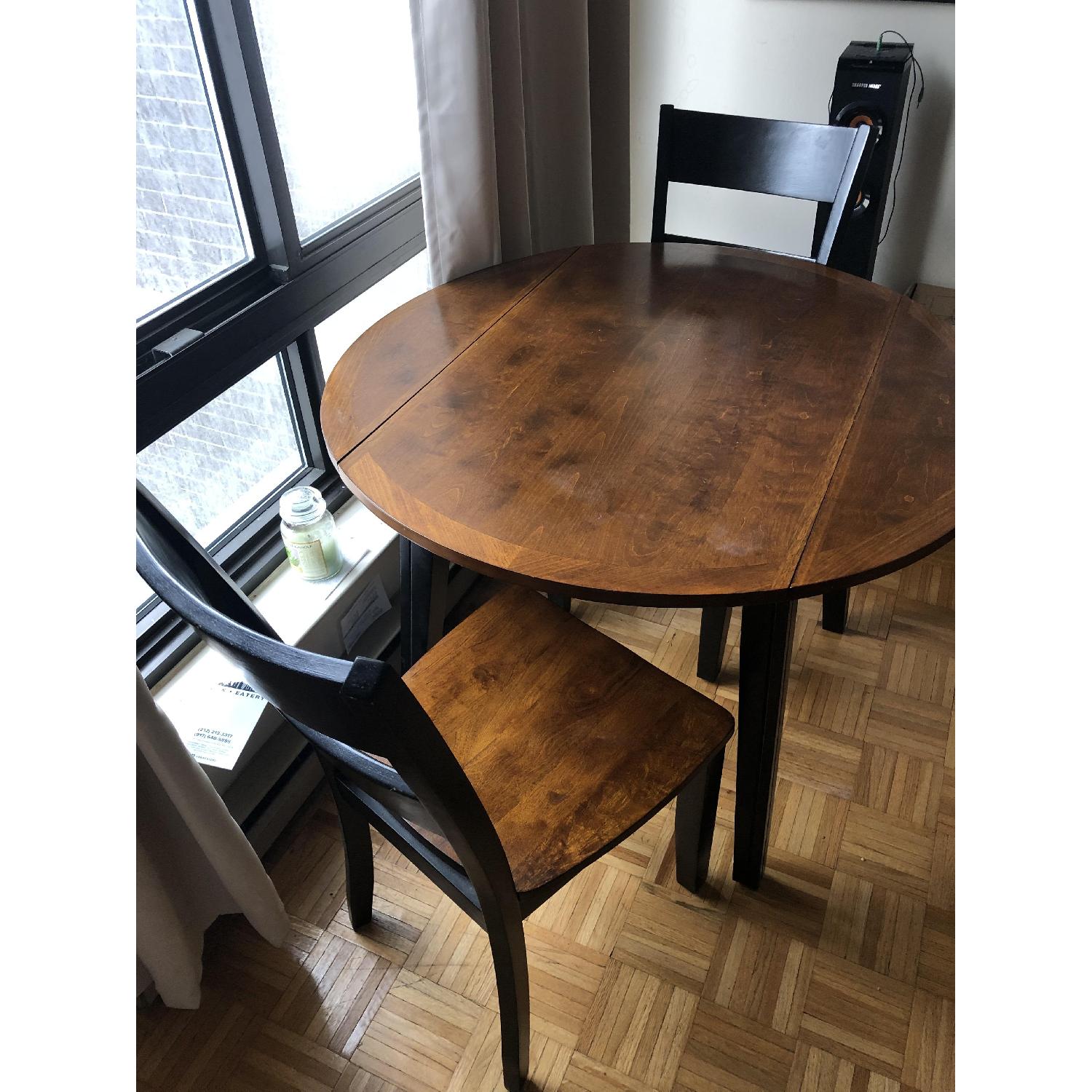 Bob's Blake Cherry Wood Dining Table w/ 2 Chairs - AptDeco