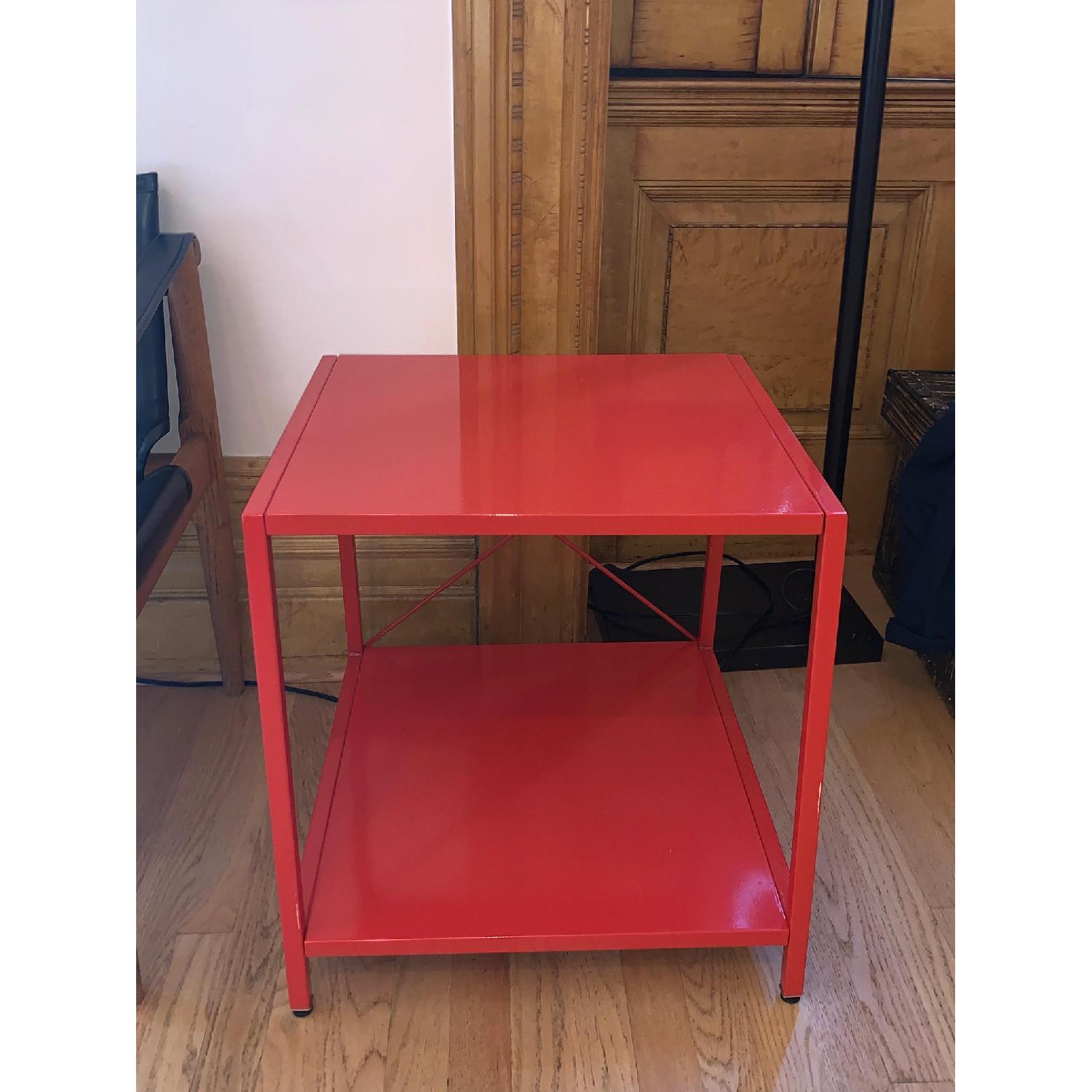 CB2 orange side table - AptDeco