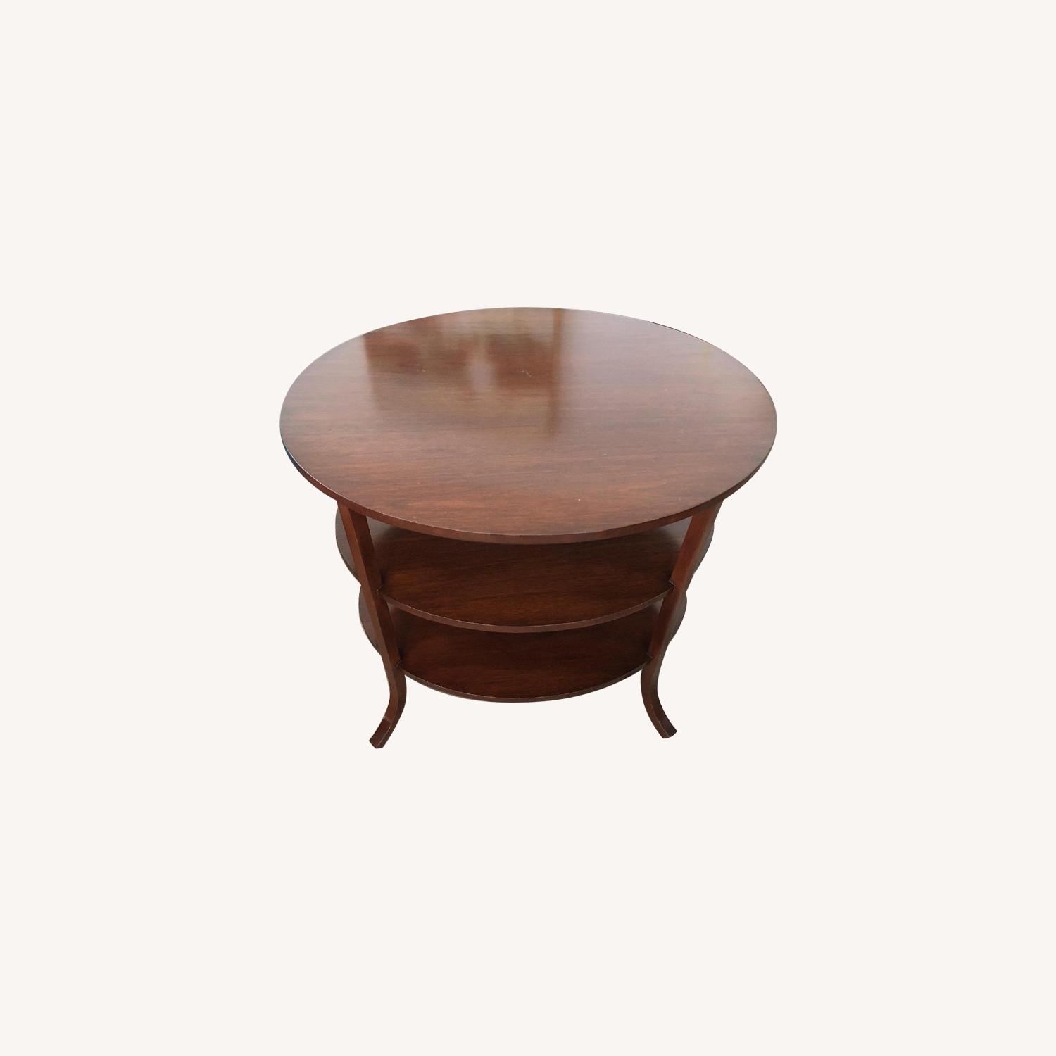 Oval solid wood side table with 2 shelves - AptDeco