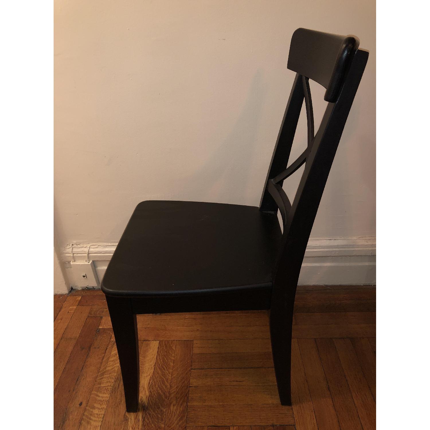 Ikea Black Wood Dining Chairs - AptDeco
