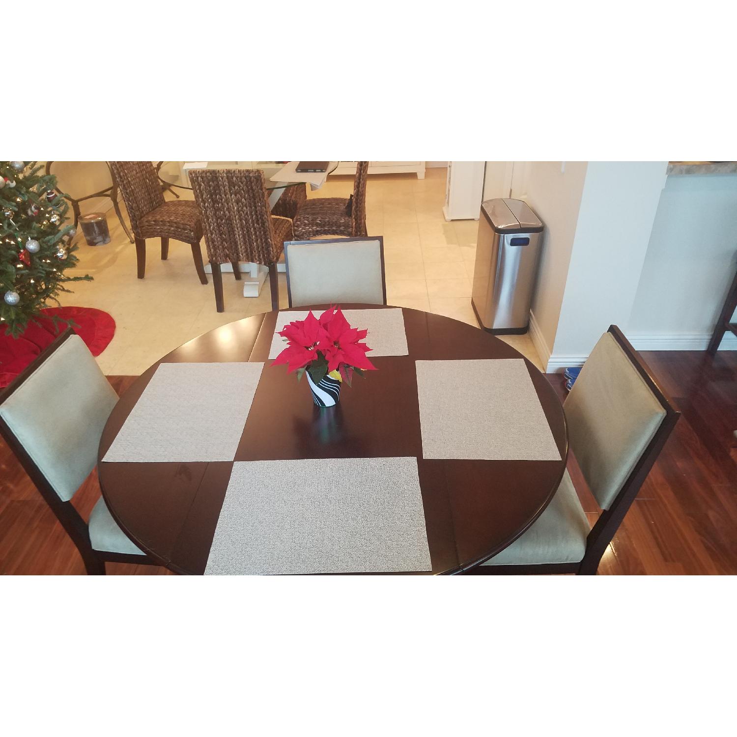 Macy's Addison Solid Wood Round Drop Leaf Dining Room Table - AptDeco