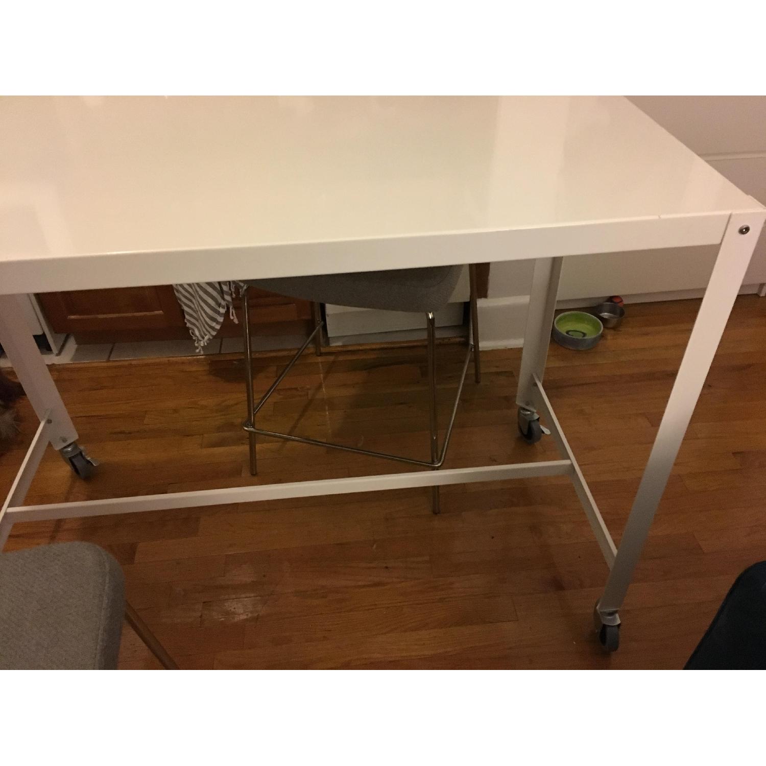 CB2 Go-Cart White Rolling Counter Table/Stand Up Desk - AptDeco