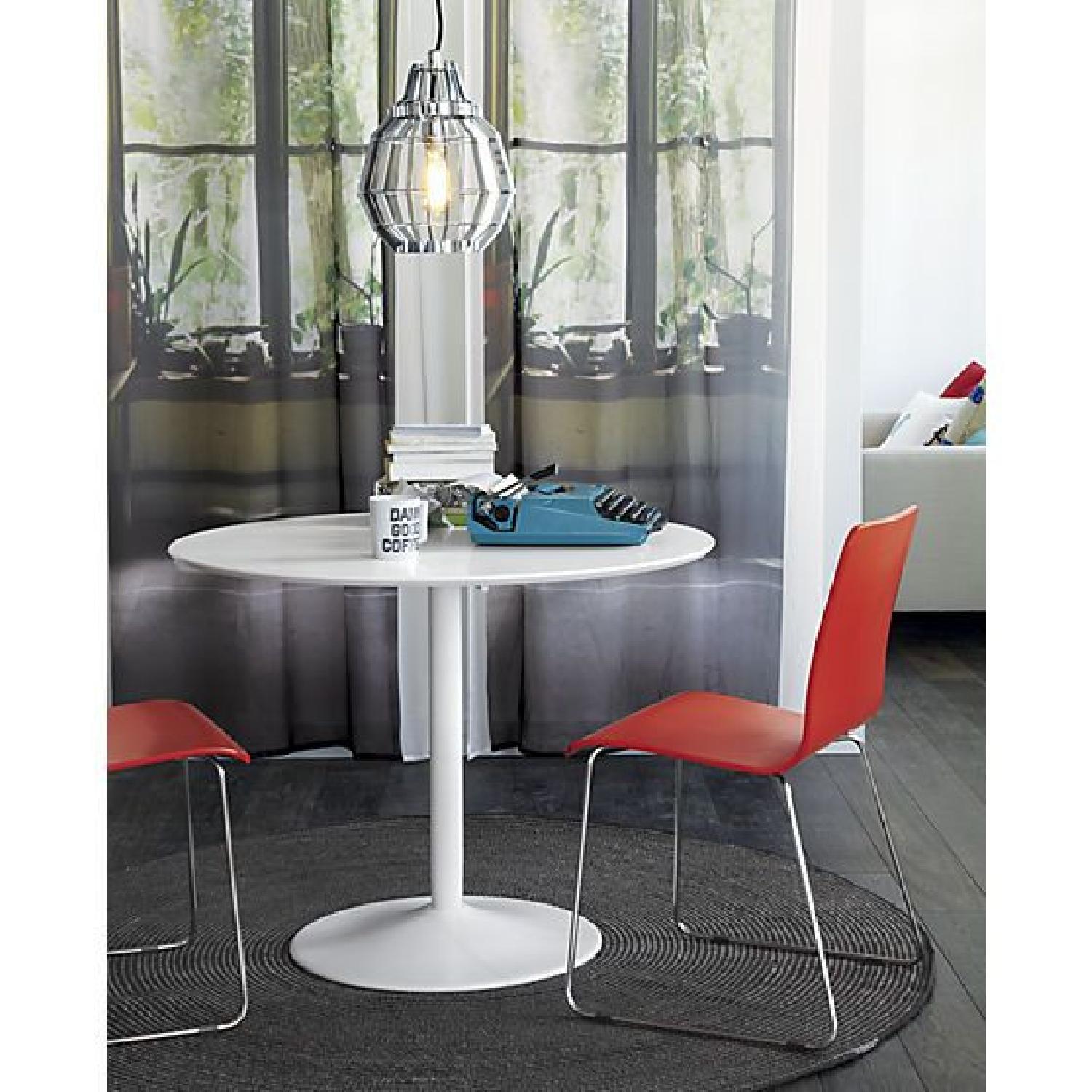 CB2 White Round Dining Table