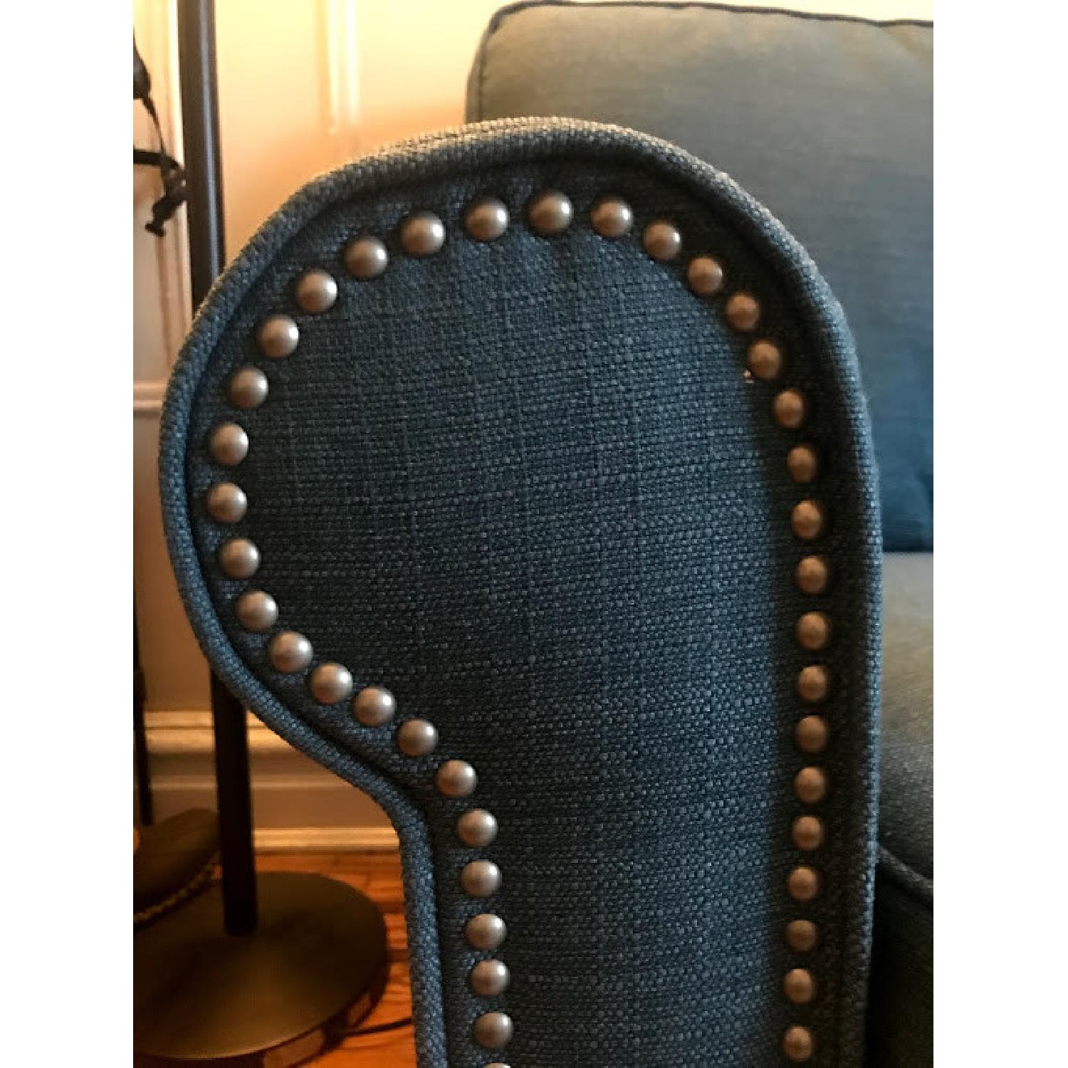 Blue Couch with Rivets - AptDeco