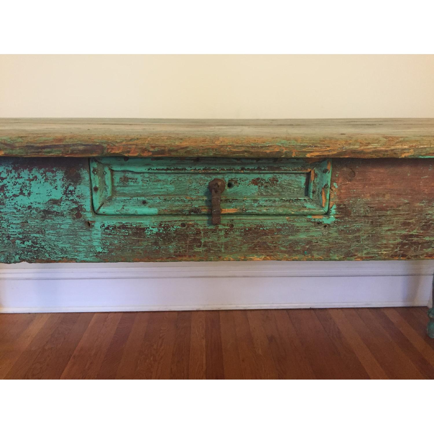 Distressed Wood Farmhouse Dining Table - AptDeco