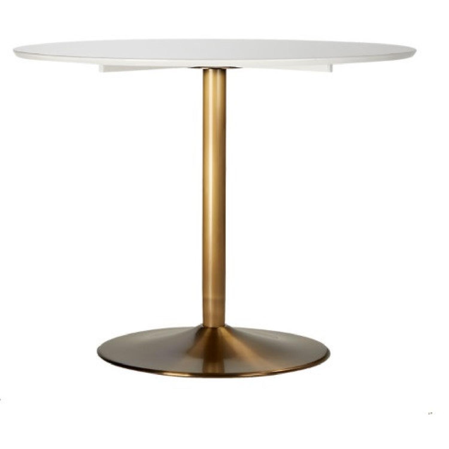 CB2 Odyssey Brass Dining Table - AptDeco