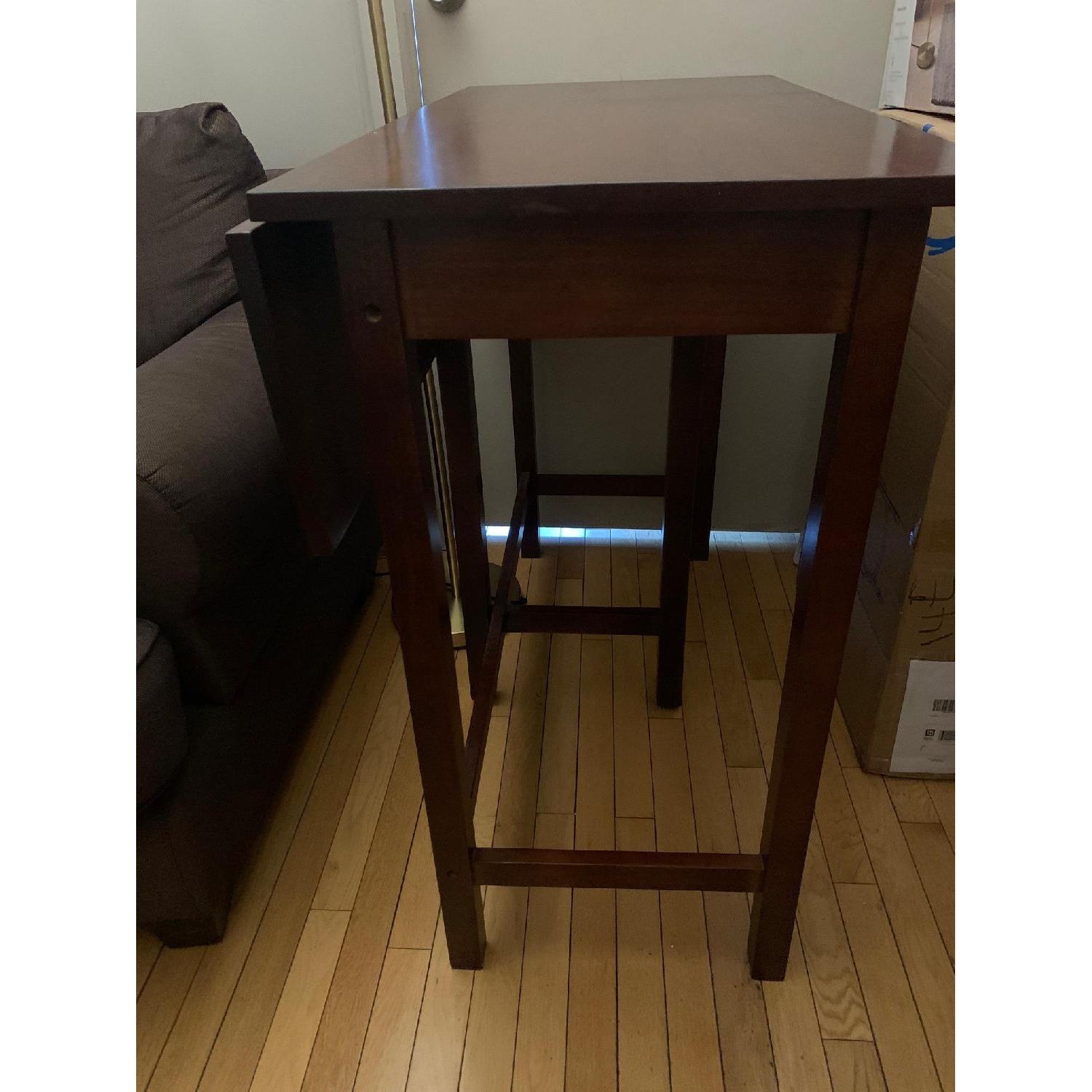 Expandable Hightop Table and stools - AptDeco