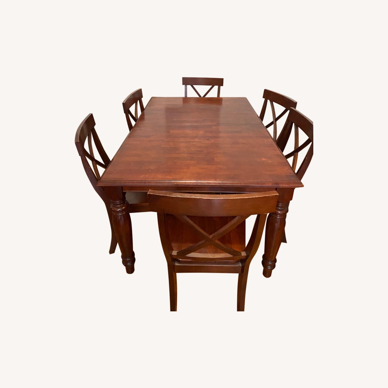 Pier One Imports Dining Set with Hidden Leaf - AptDeco