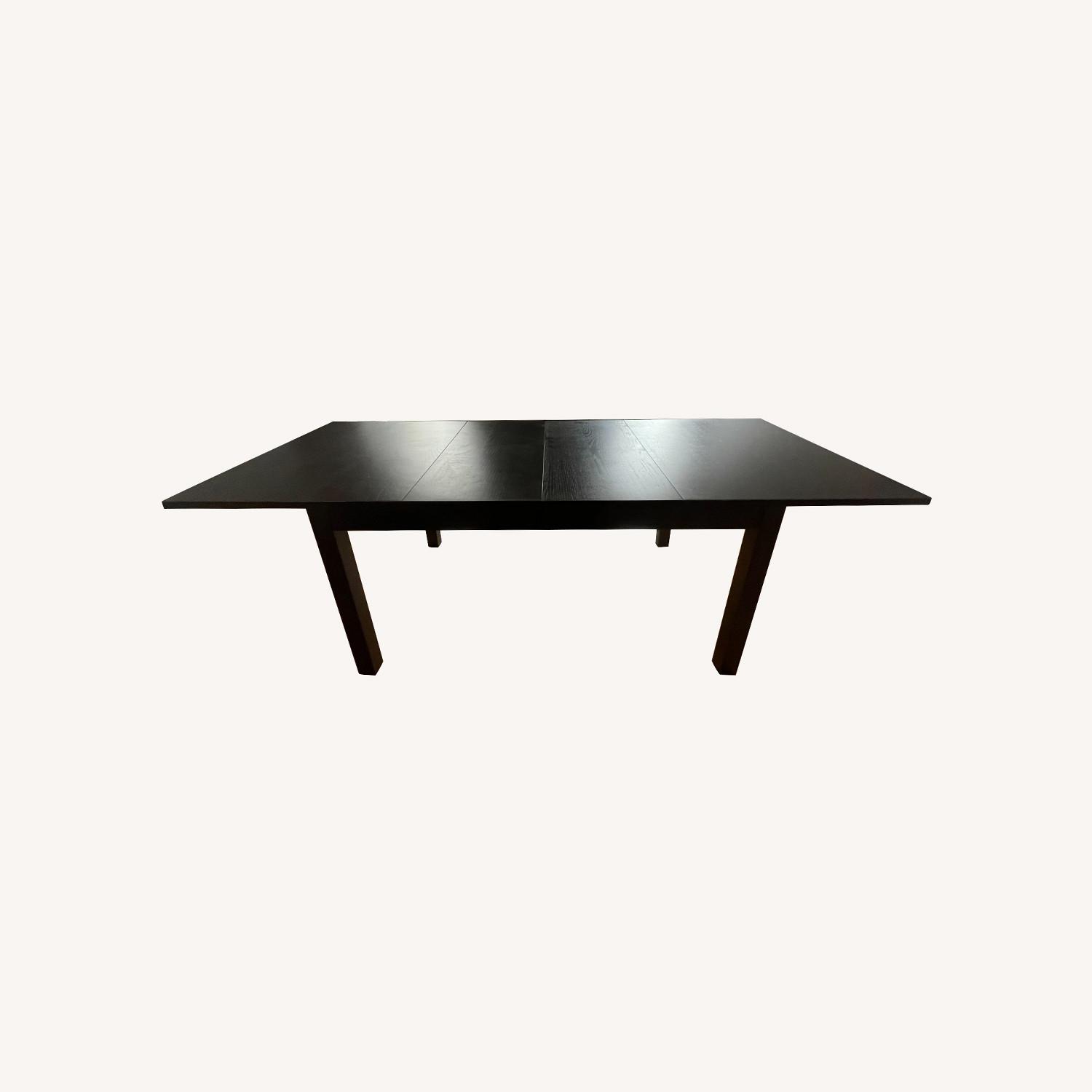 IKEA Black-brown Extendable Dining Table - AptDeco