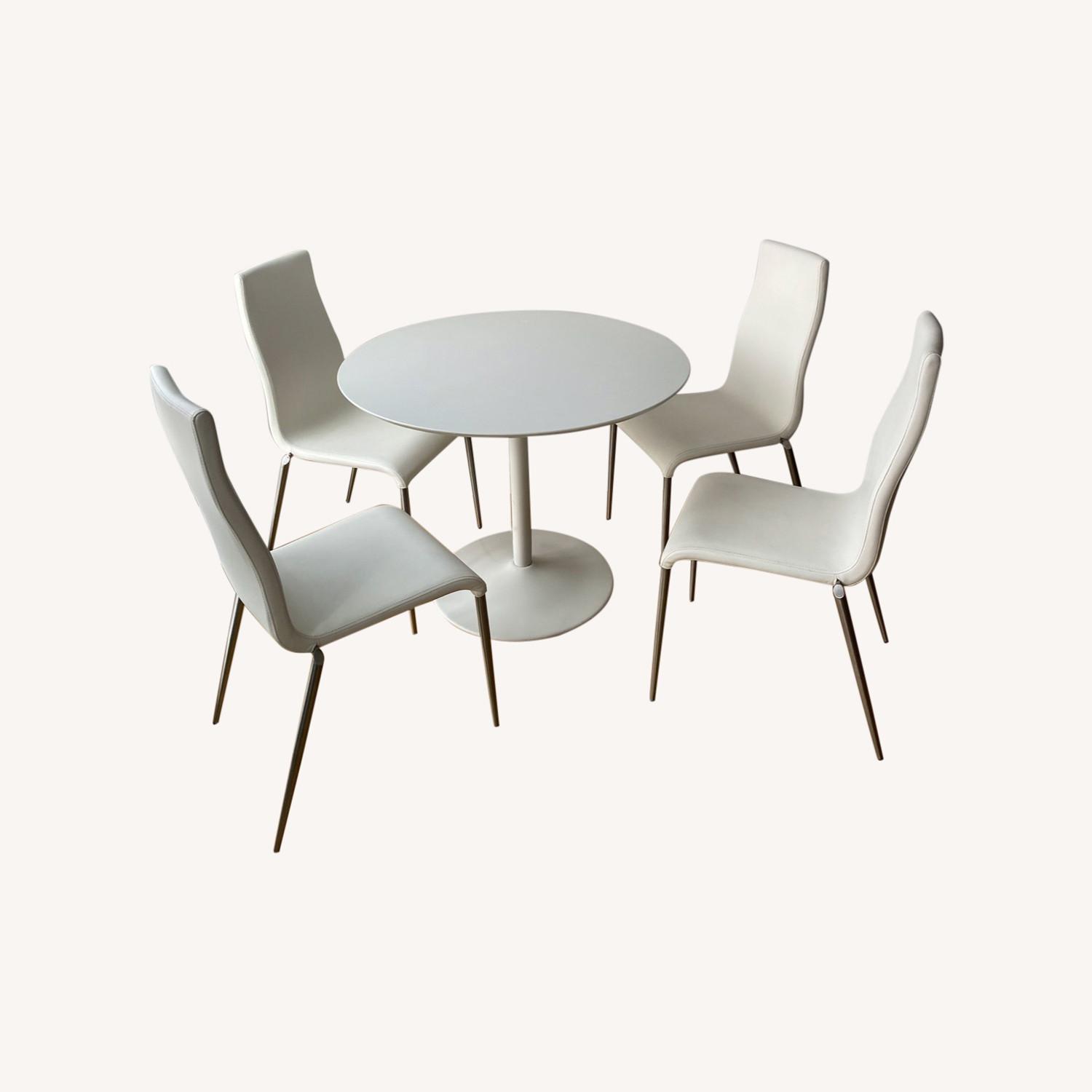 CB2 White Odyssey Dining Table with 4 White Chairs - AptDeco