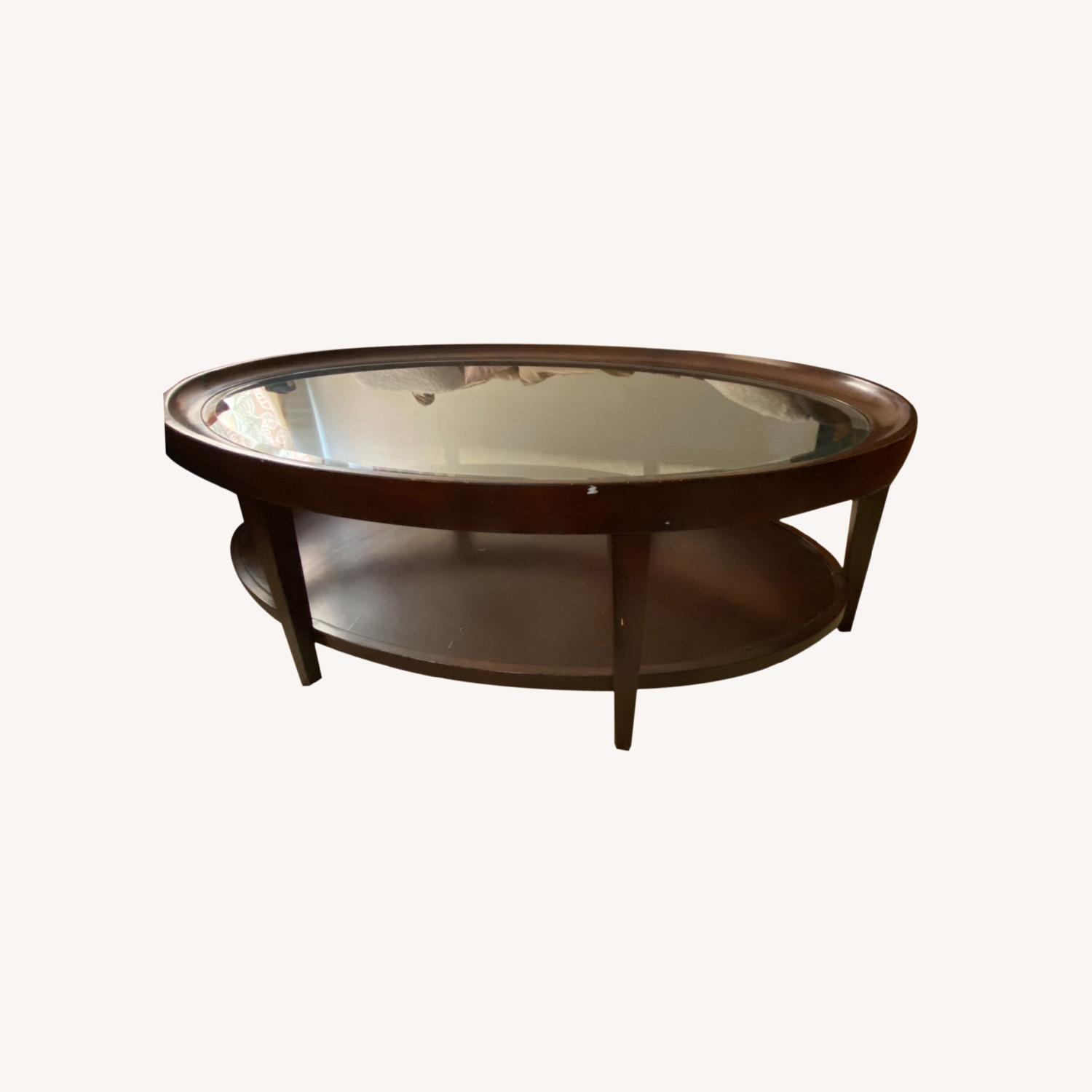 Raymour & Flanigan Cherry Wood Coffee Table - AptDeco